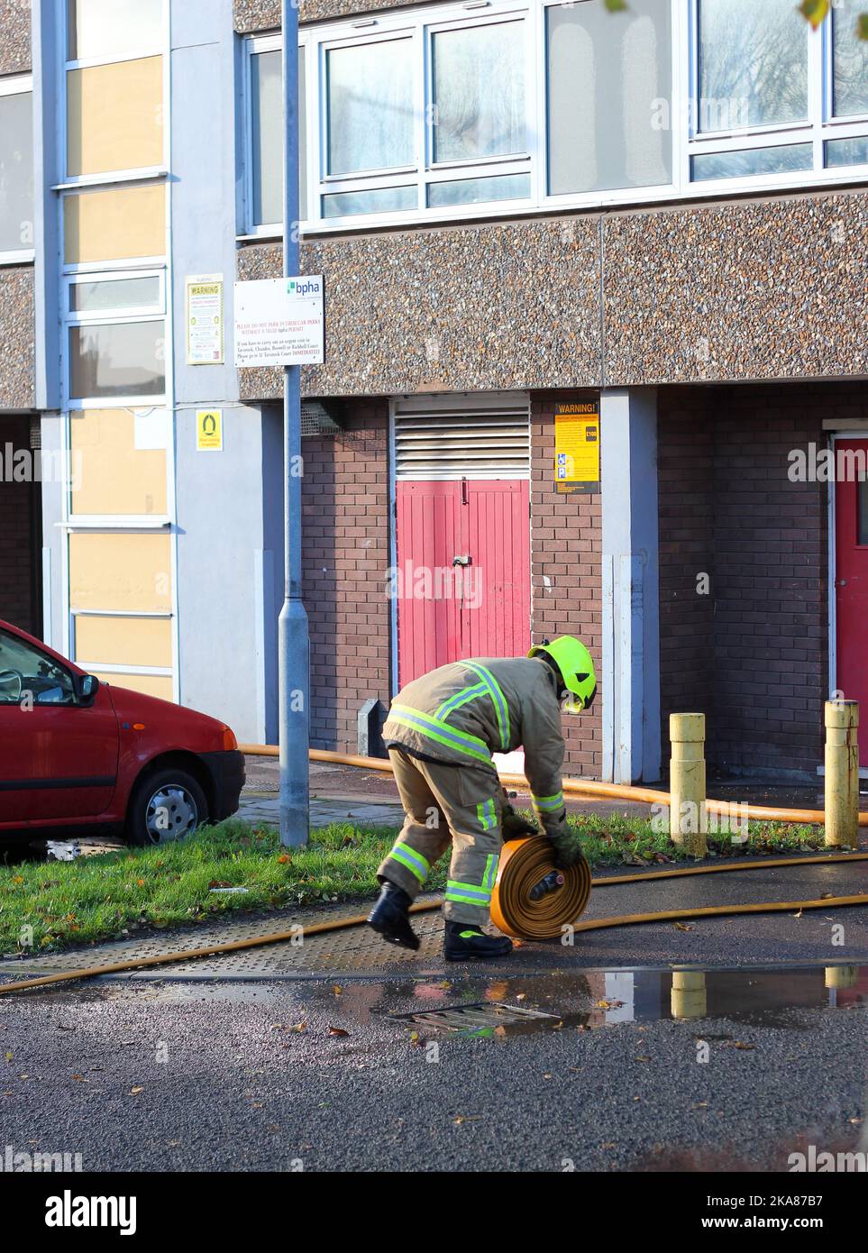 Firemen attendung the scene of a fire in a block of flates in Bedford ...