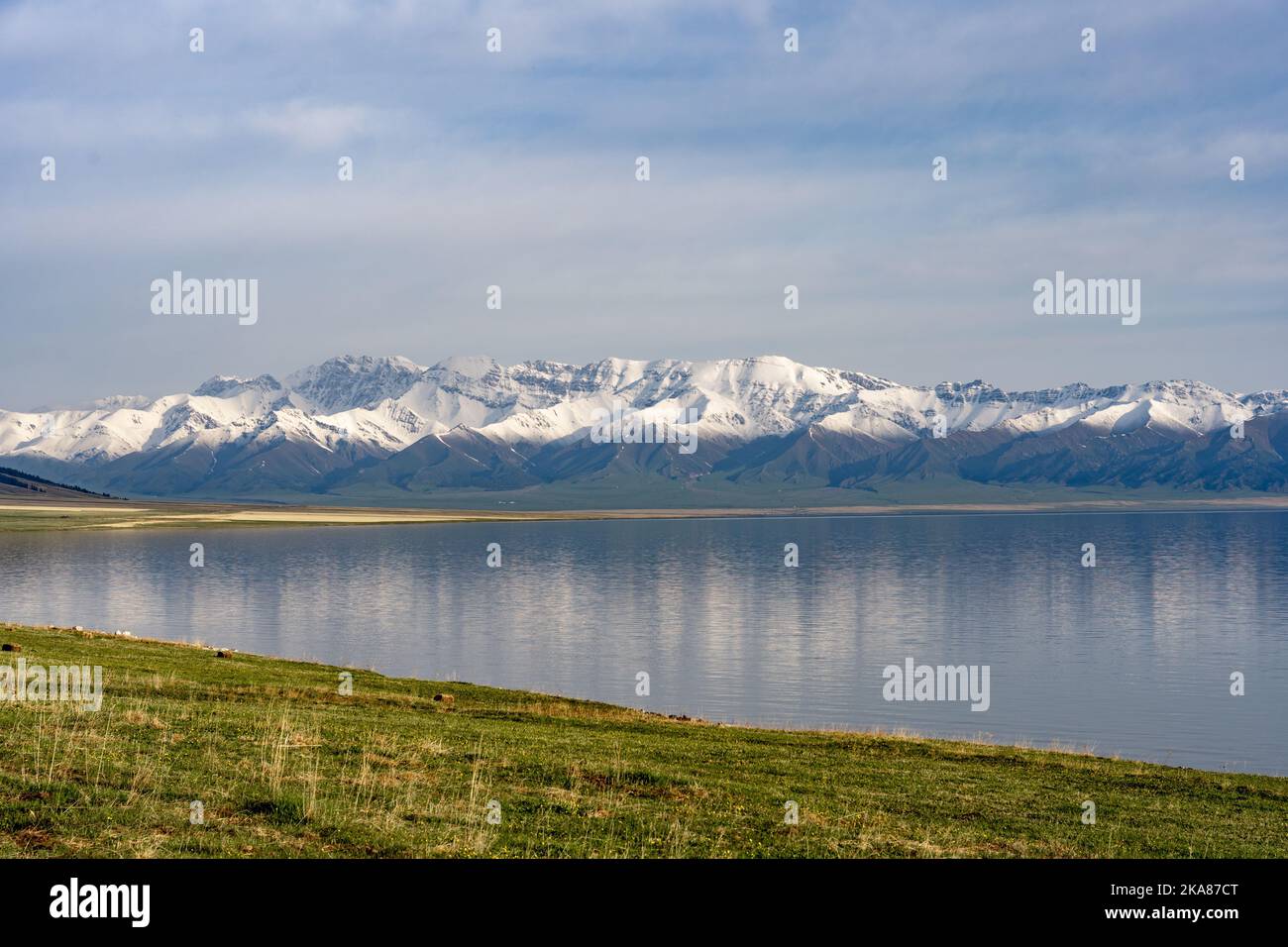 An aerial view of Sayram Lake near the mountains in China Stock Photo ...