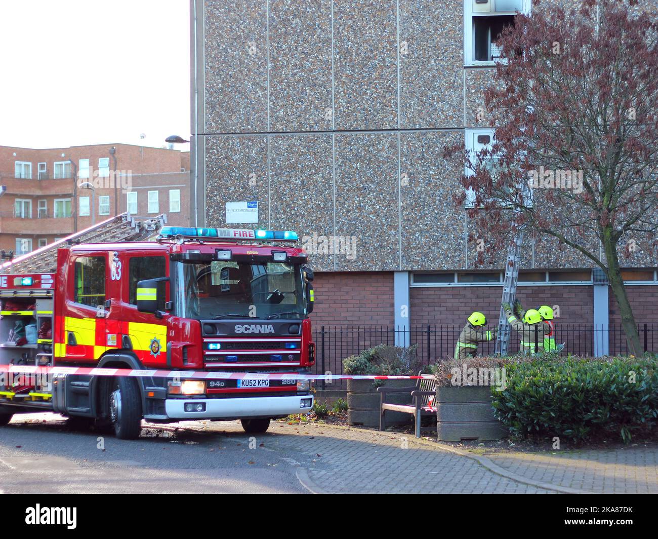 Firemen attendung the scene of a fire in a block of flates in Bedford ...