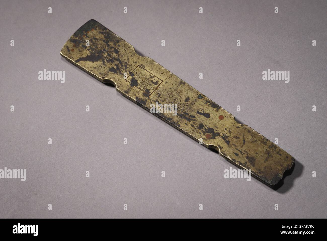A Guqin (traditional Chinese musical instrument) on a gray background ...