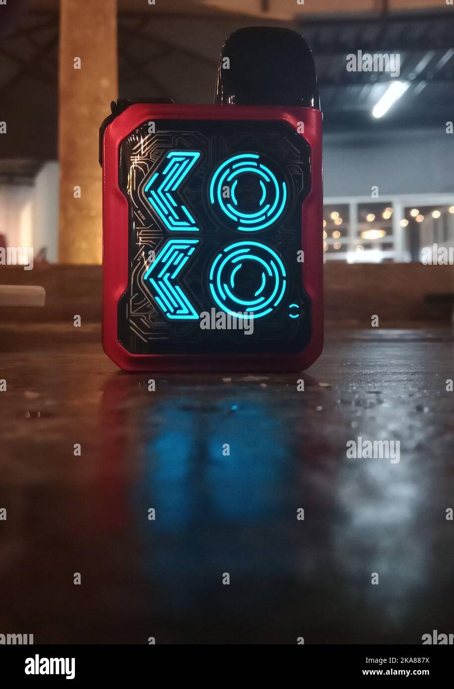 A low angle shot of modern Vape for smoking at Meekow cafe with blurred ...