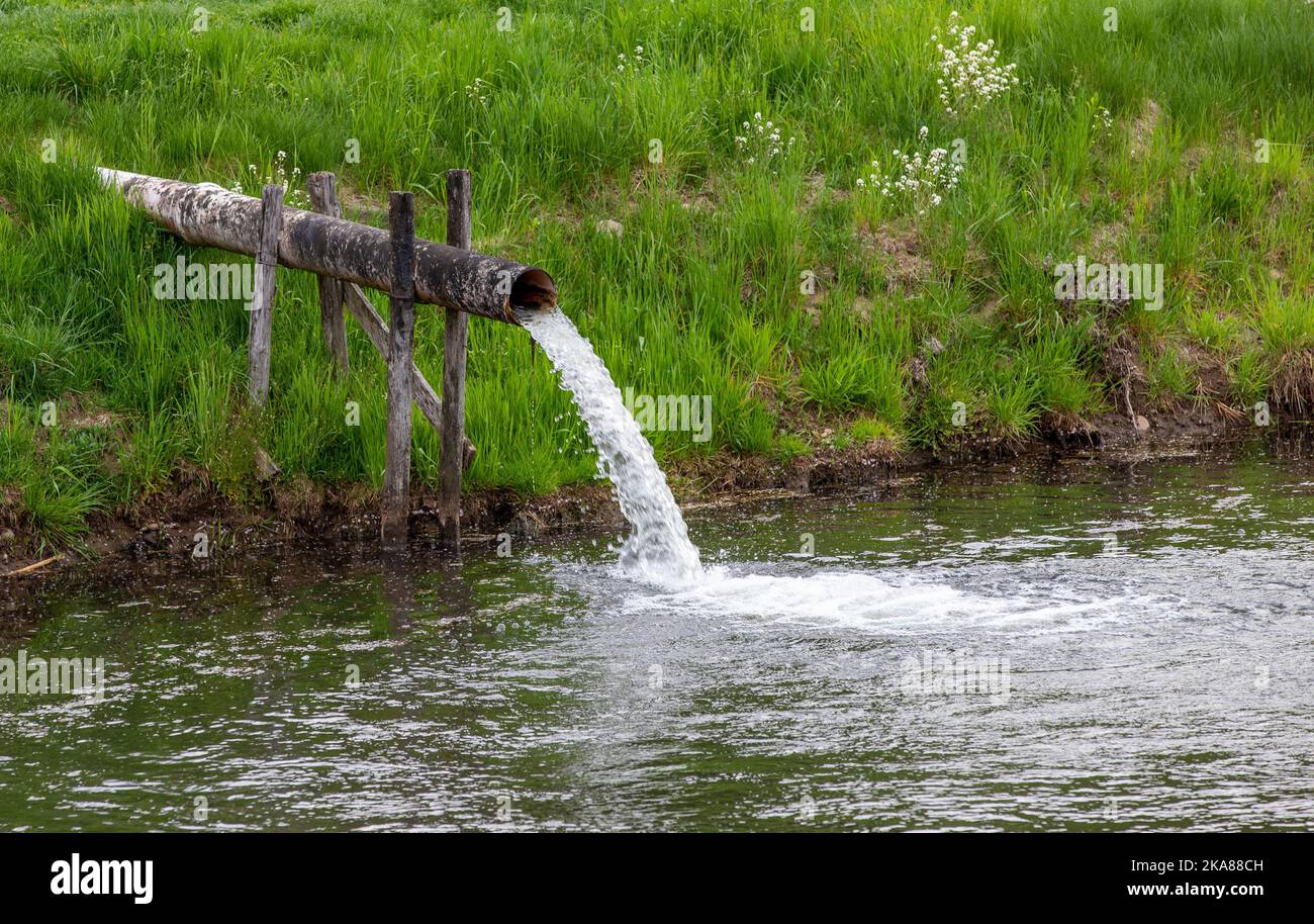 Water flows from pipe in hi-res stock photography and images - Alamy
