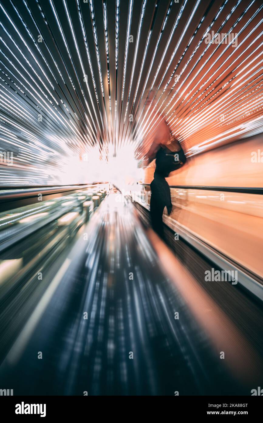 A vertical long exposure shot of a light tunnel Stock Photo - Alamy