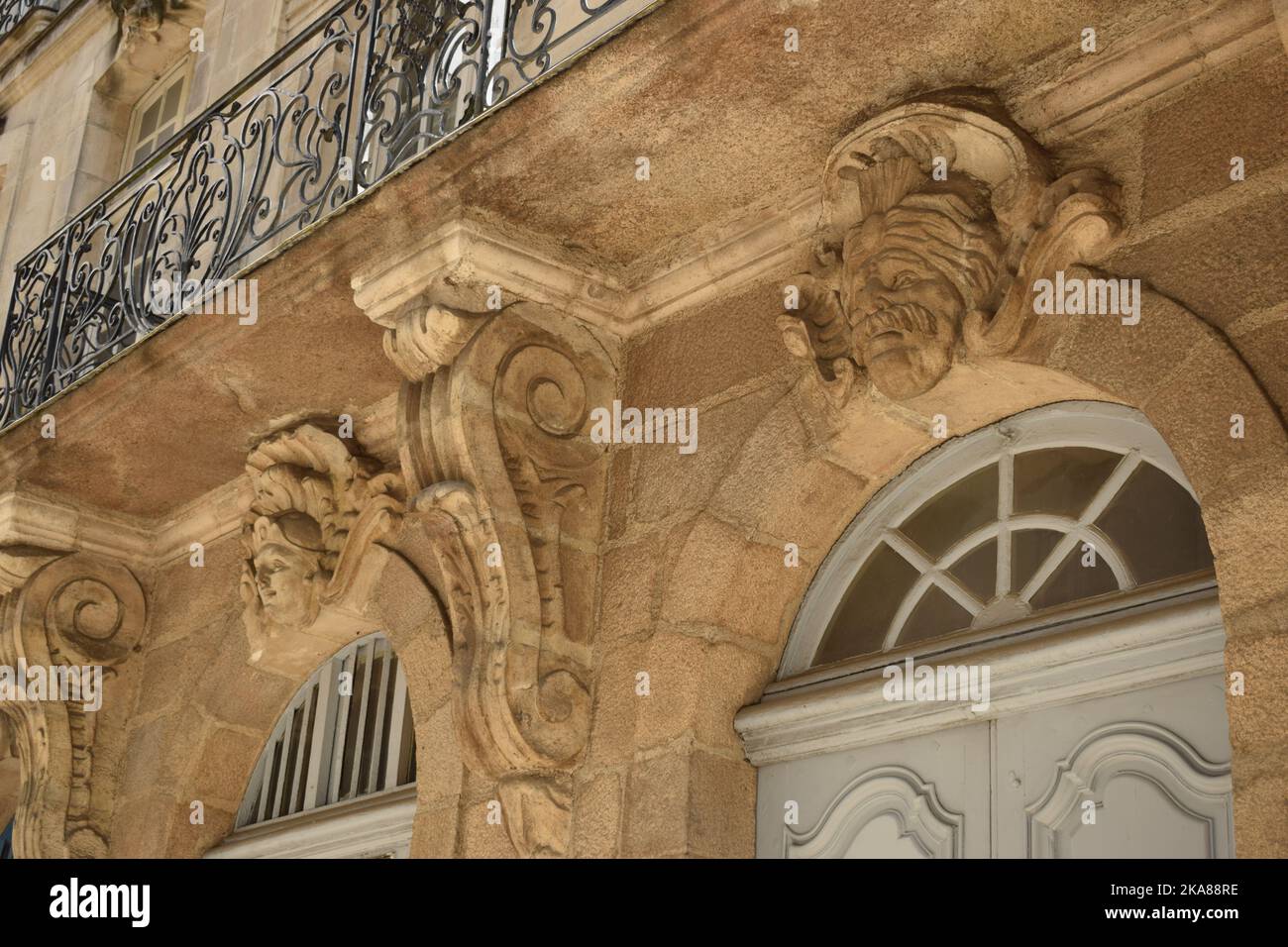 The facade of nan old building with carved walls Stock Photo - Alamy