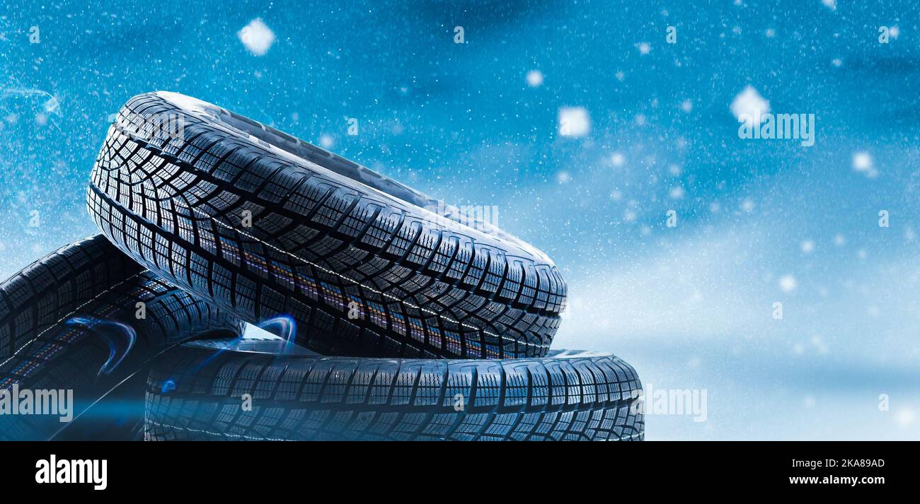 Stack of wheel new black tyres for winter car driving isolated on ...