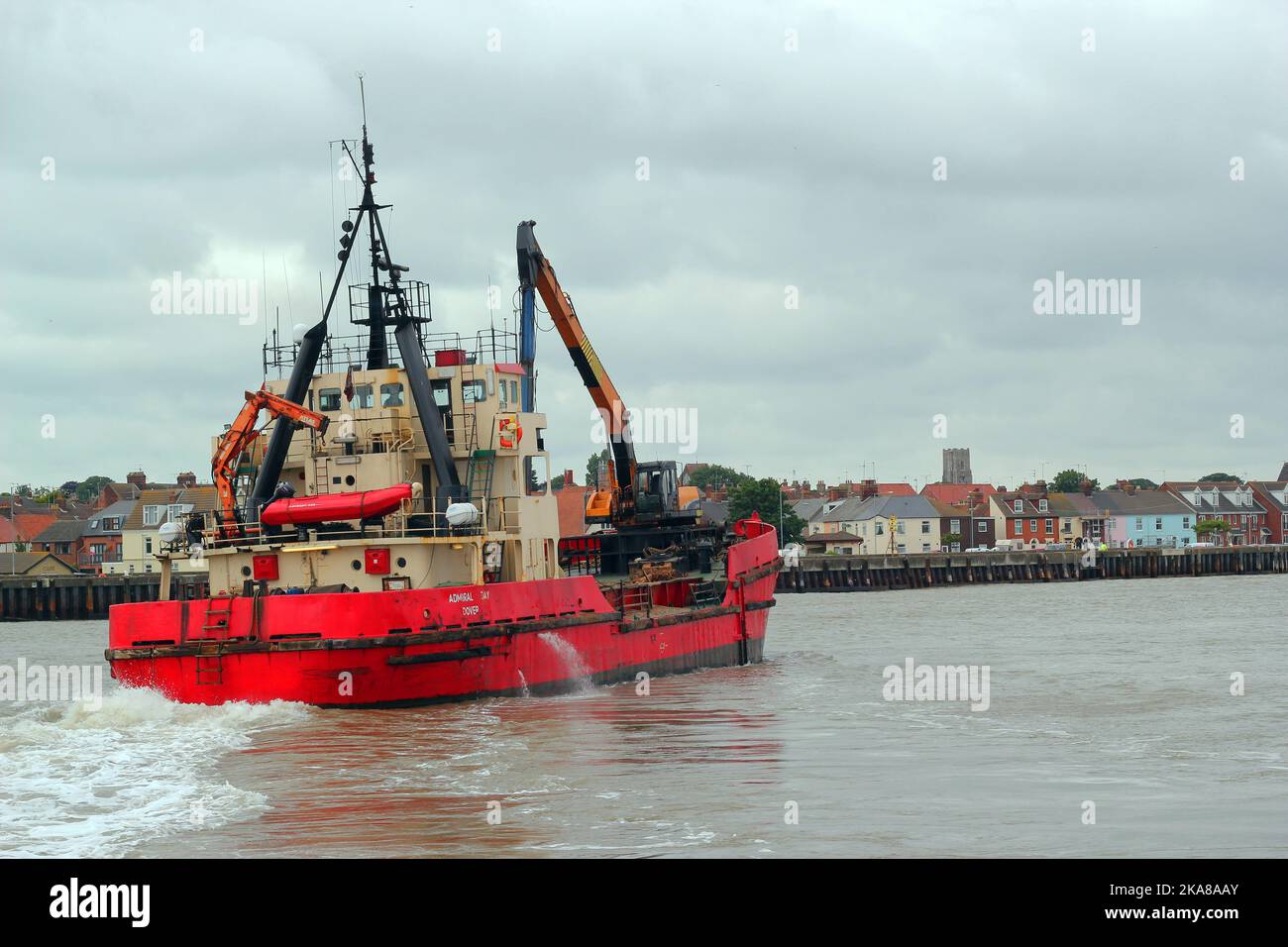 Dredging boat entering and leaving the Great Yarmouth harbour at ...