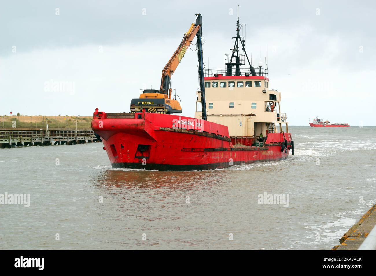 Dredging boat entering and leaving the Great Yarmouth harbour at ...