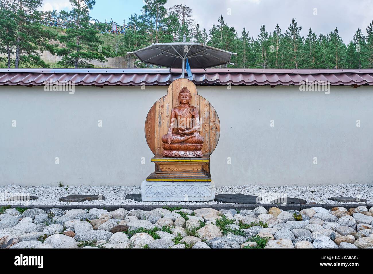 Buddha statue in garden of good thoughts. Buddhist datsan on Bald ...