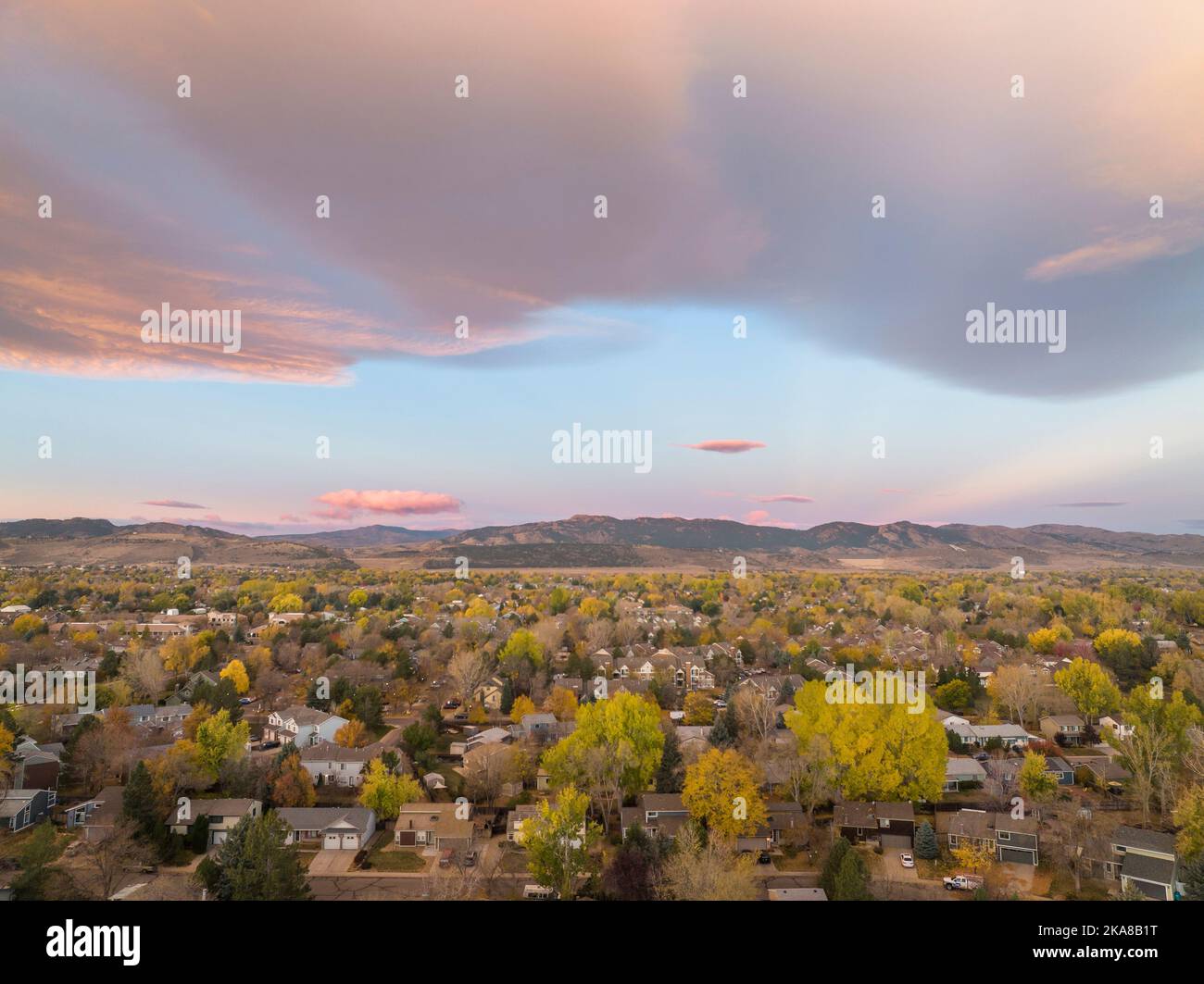 October dawn over Fort Collins and foothills of Rocky Mountains in ...