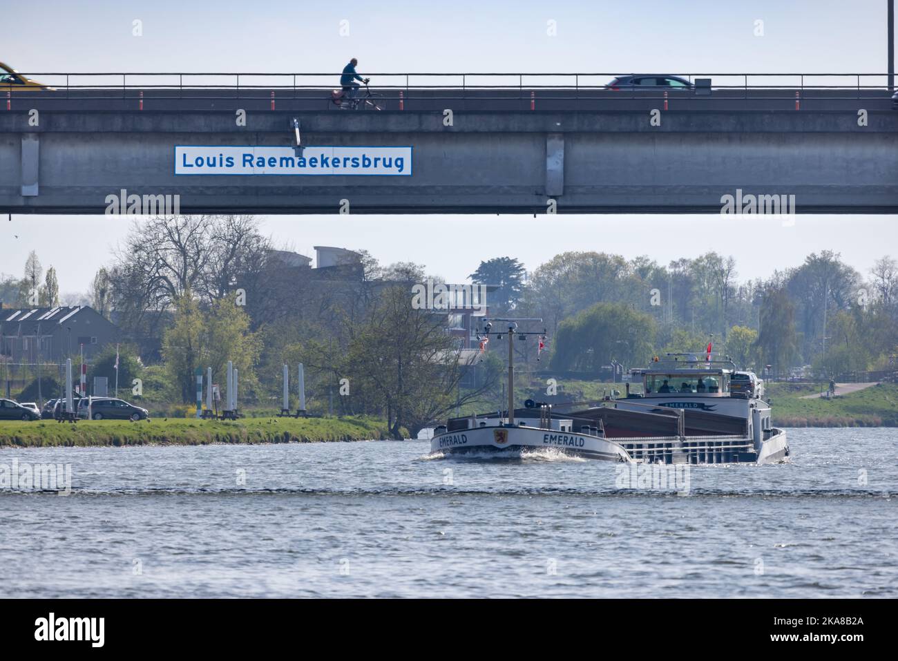 A cargo boat on River Maas in Roermond going under the Louis the ...