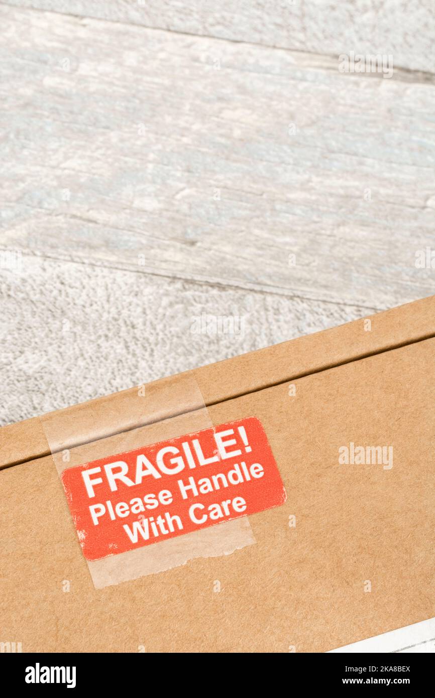 Handle with care adhesive label hi-res stock photography and images - Alamy