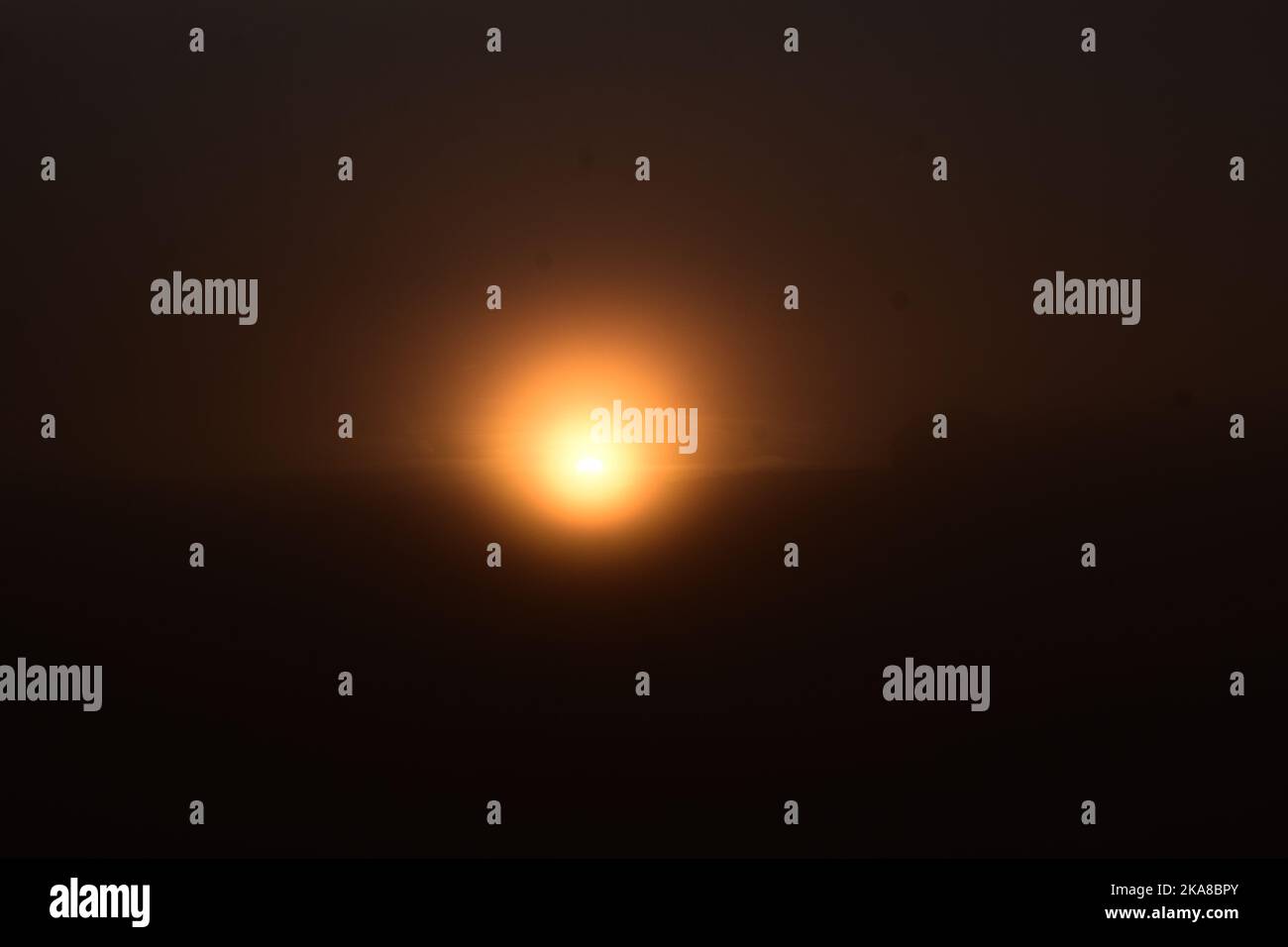 sun in the heavy morning fog Stock Photo - Alamy