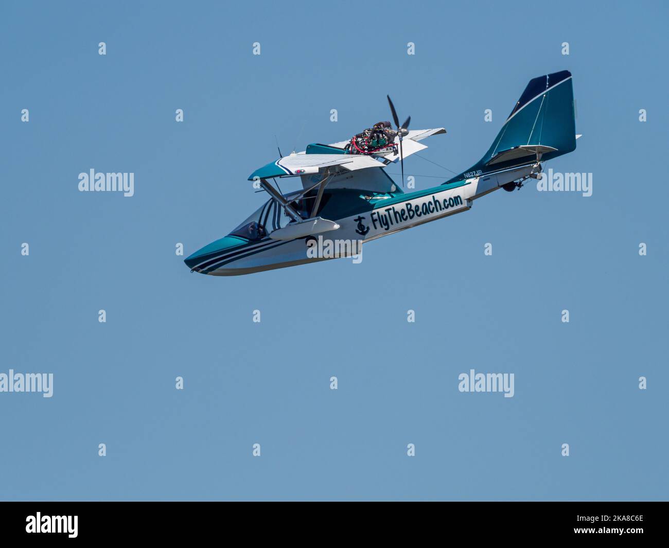 A Fly The Beach float plane descending before landing in Choctawhatchee ...