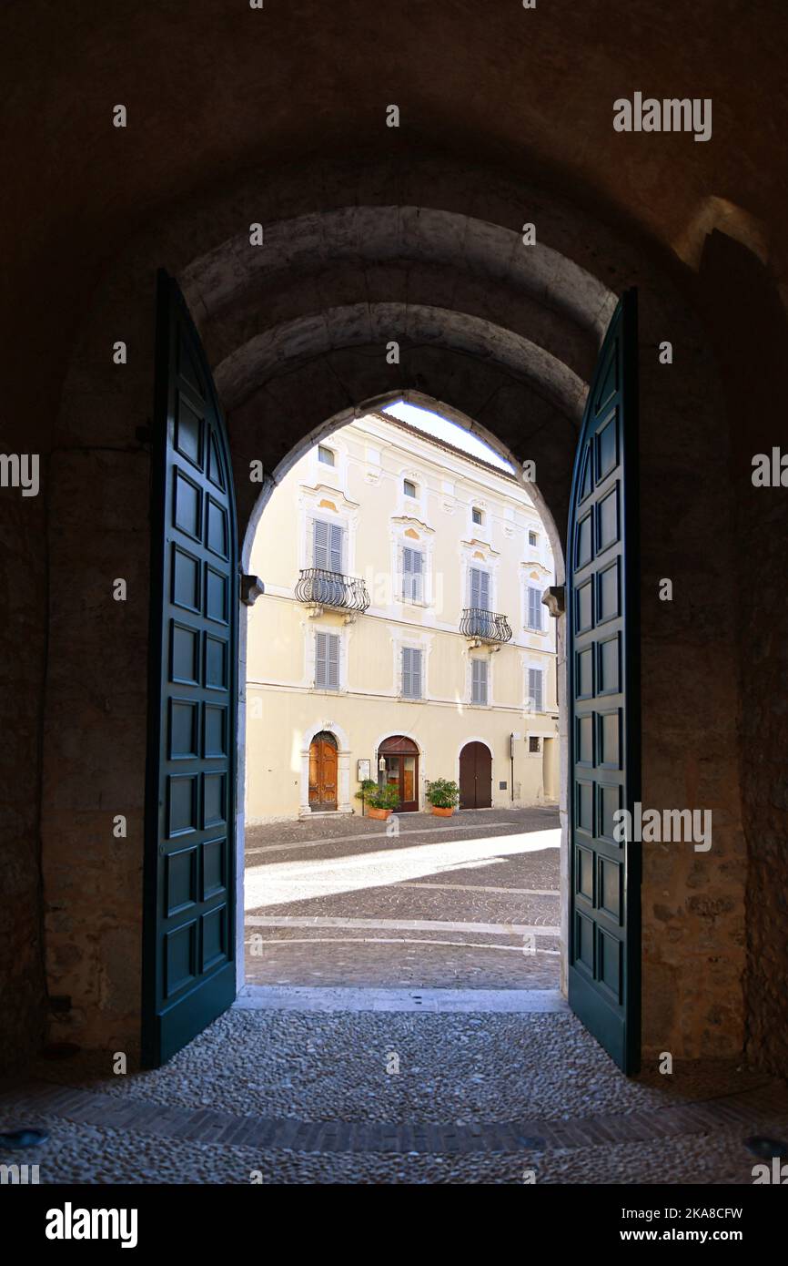 A small street between ancient buildings in Atina, a historic town in ...