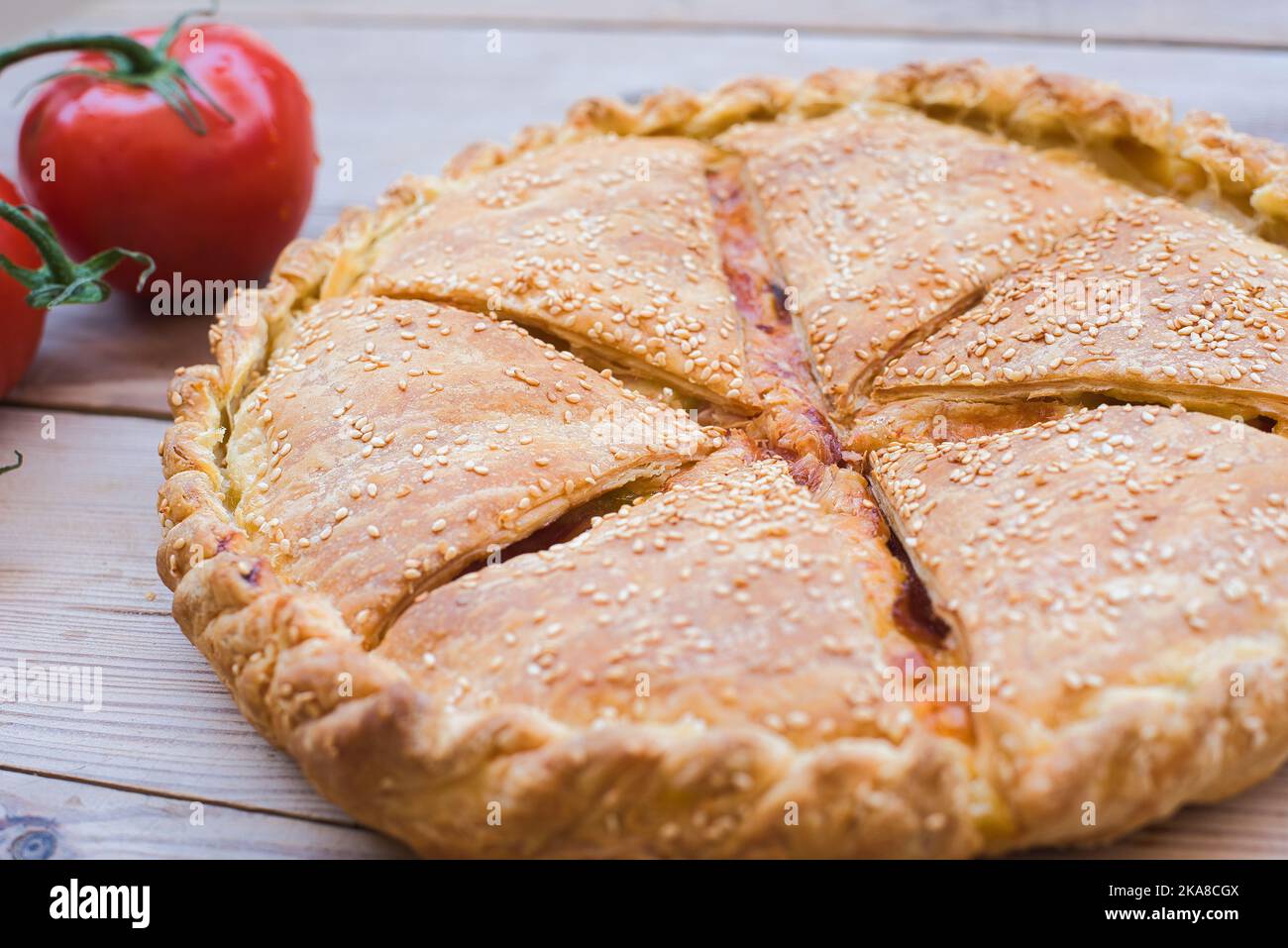 traditional pie, covered pizza baked in wood with wood Stock Photo - Alamy