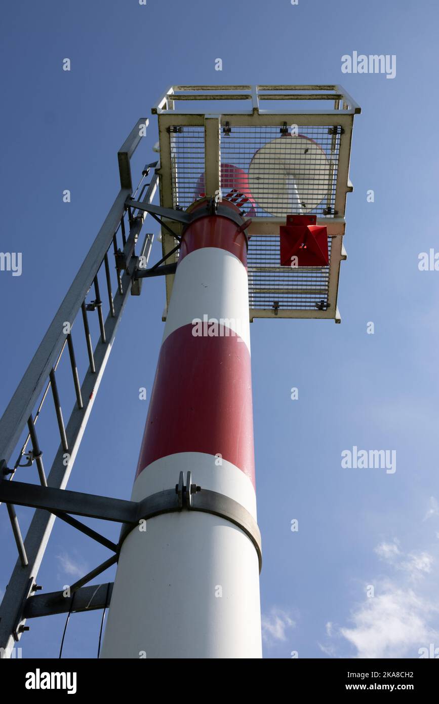 A columned self-supporting chimney on a blue sky background Stock Photo ...