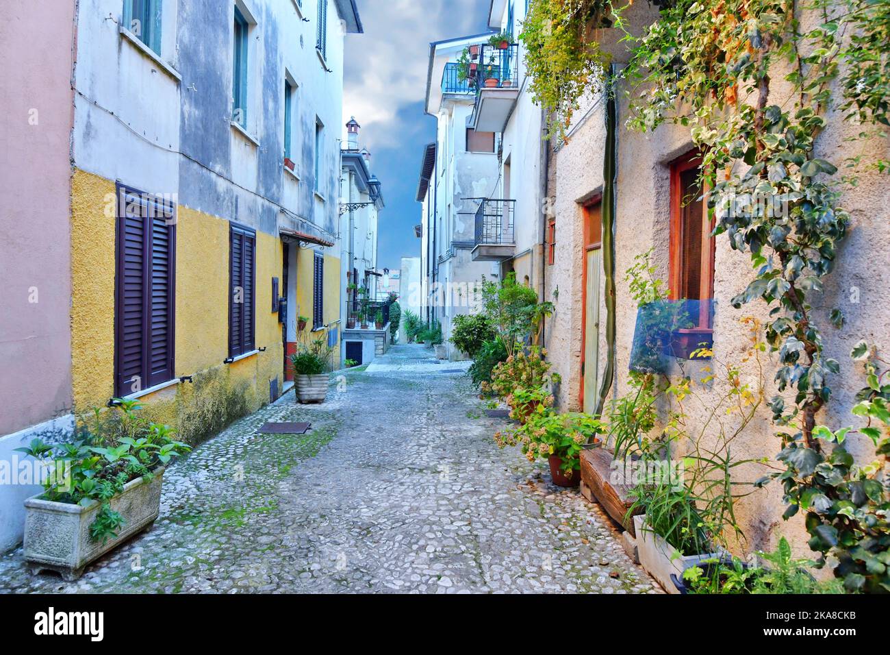 A small street between ancient buildings in Atina, a historic town in ...