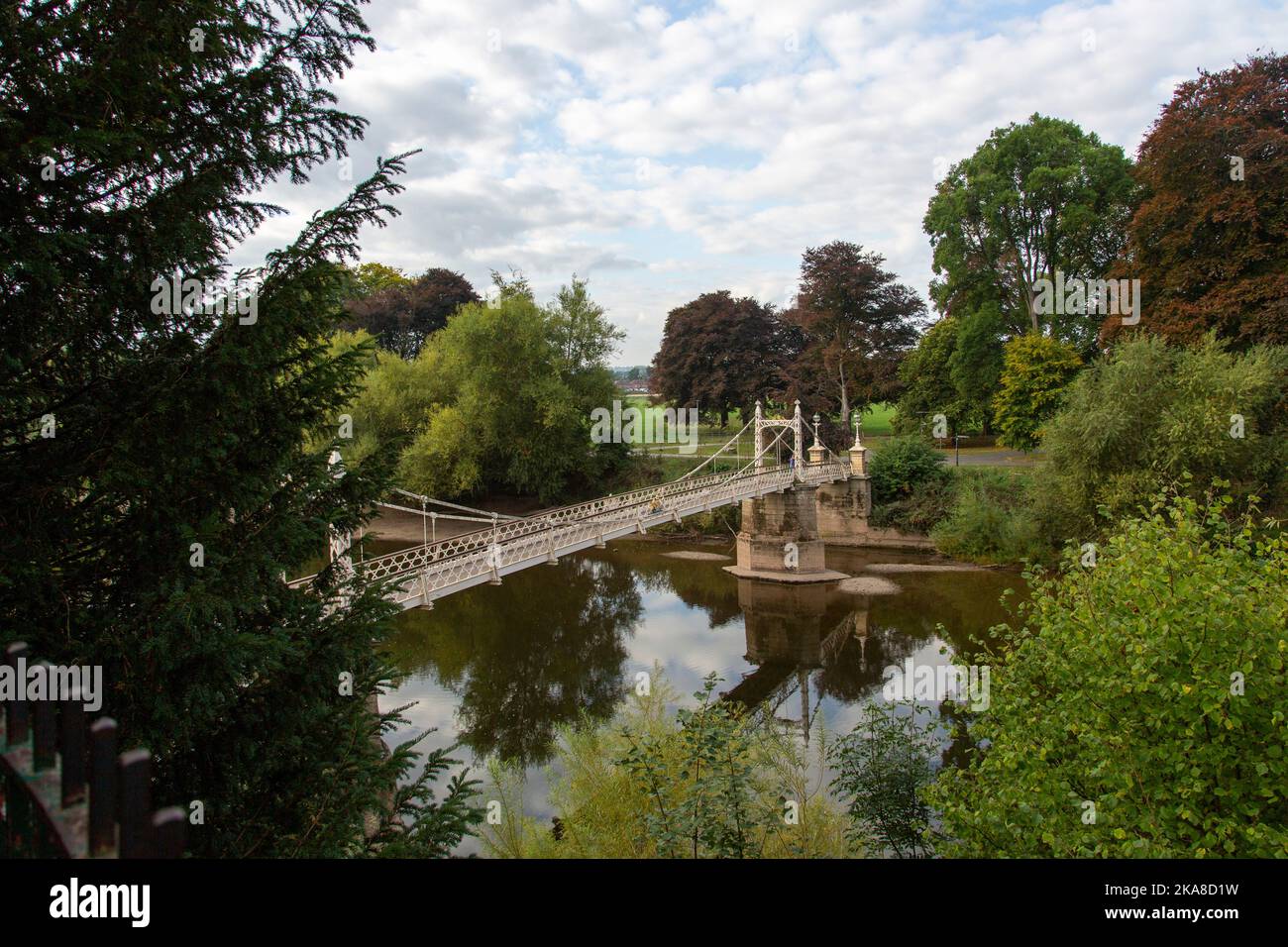 Queen Victoria Bridge, a cast iron suspension bridge crossing the river ...
