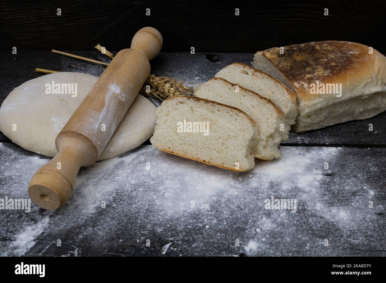 homemade bread with wheat flour on rustic wood Stock Photo - Alamy