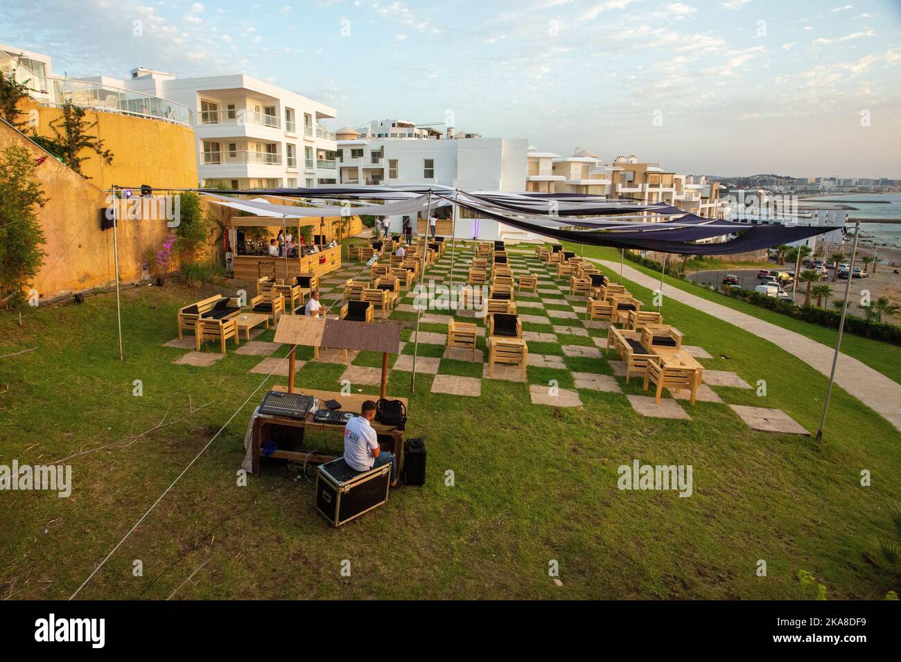 hotel patio terrace with wooden furniture Stock Photo - Alamy