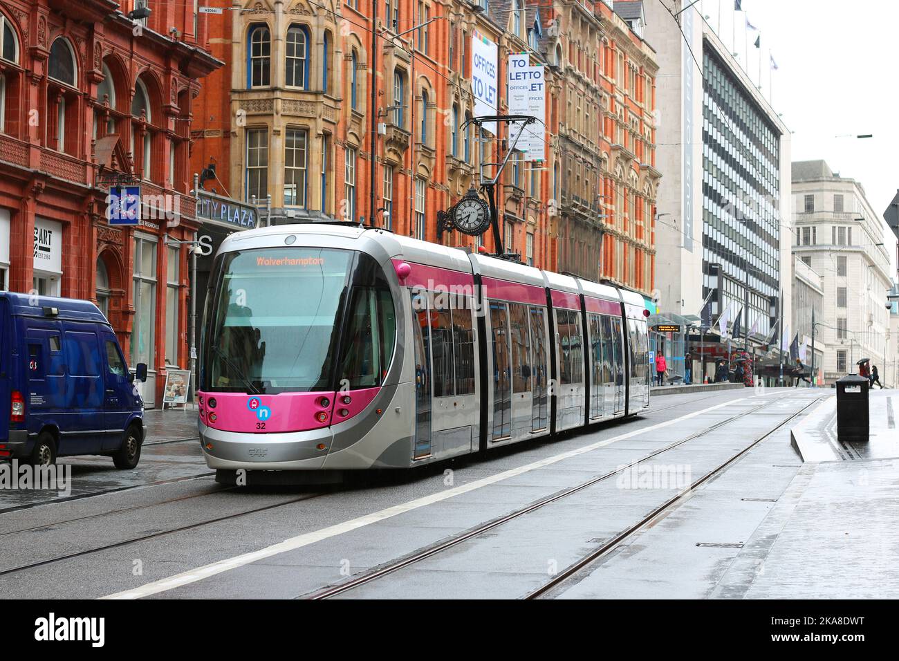 A tram on the street in the city of Birmingham, United Kingdom. Public ...
