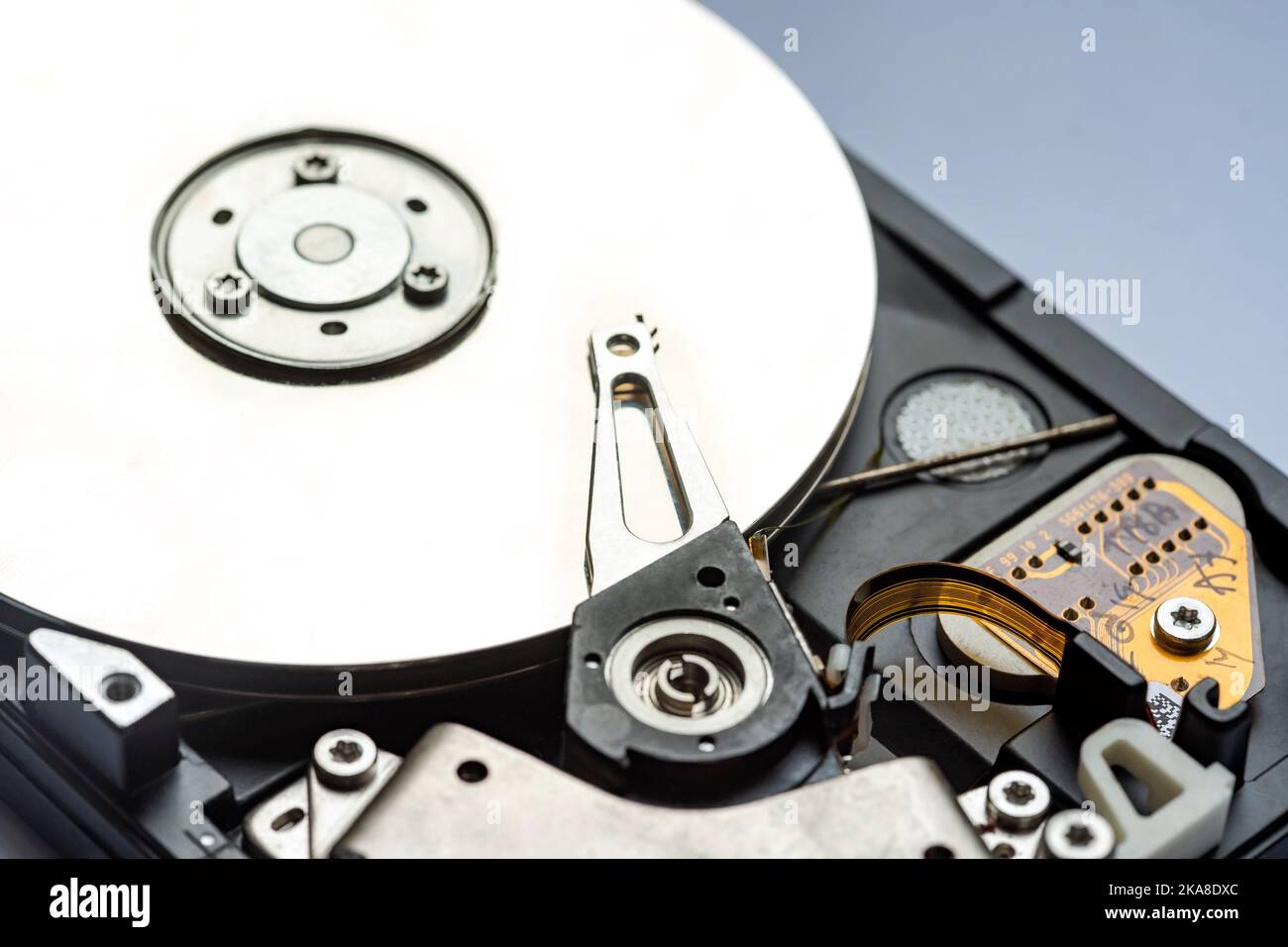 Generic 3.5 hard drive HDD disk without top cover closeup, object ...