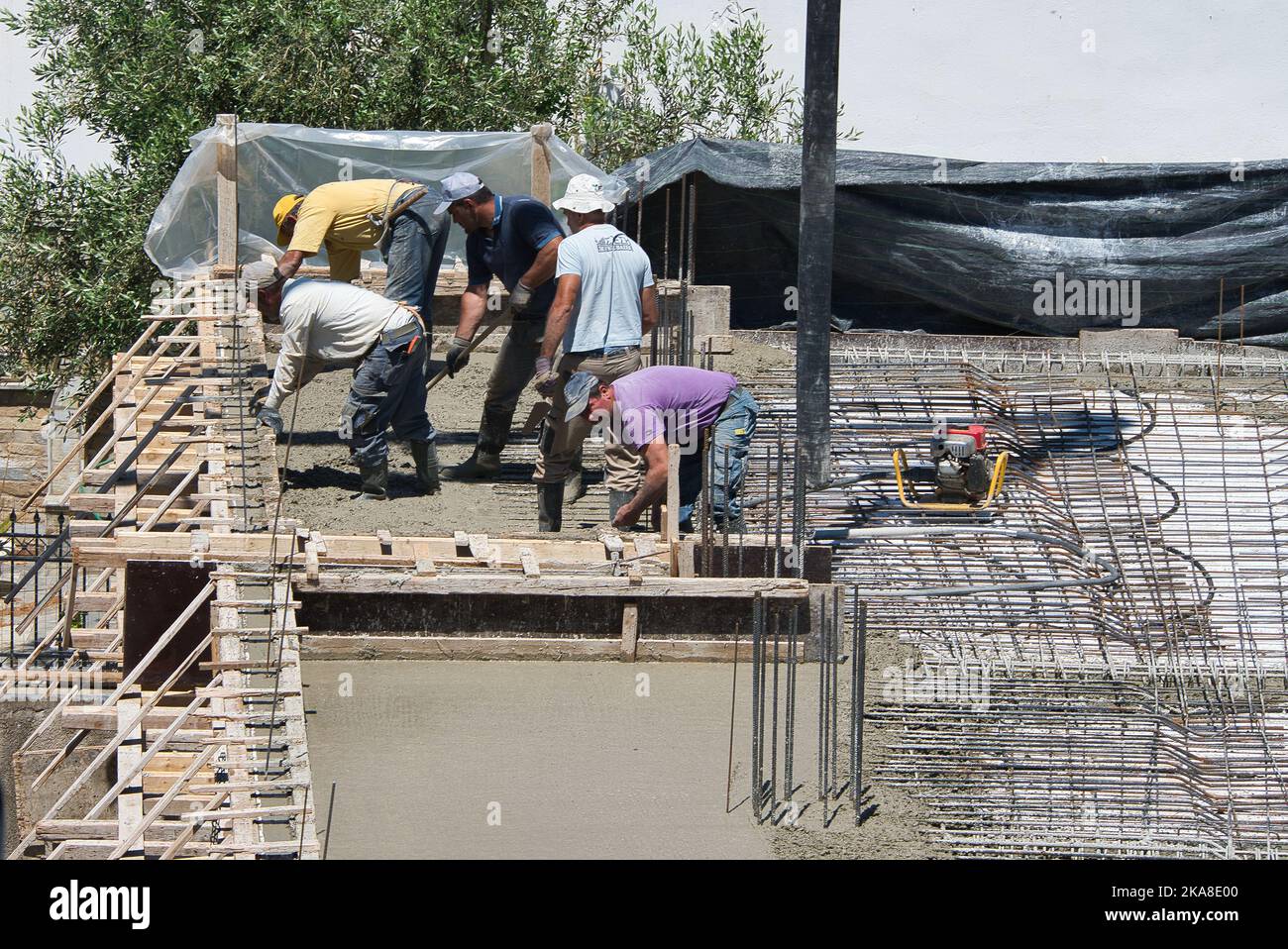 builders workers, build house building in the city center. With the ...