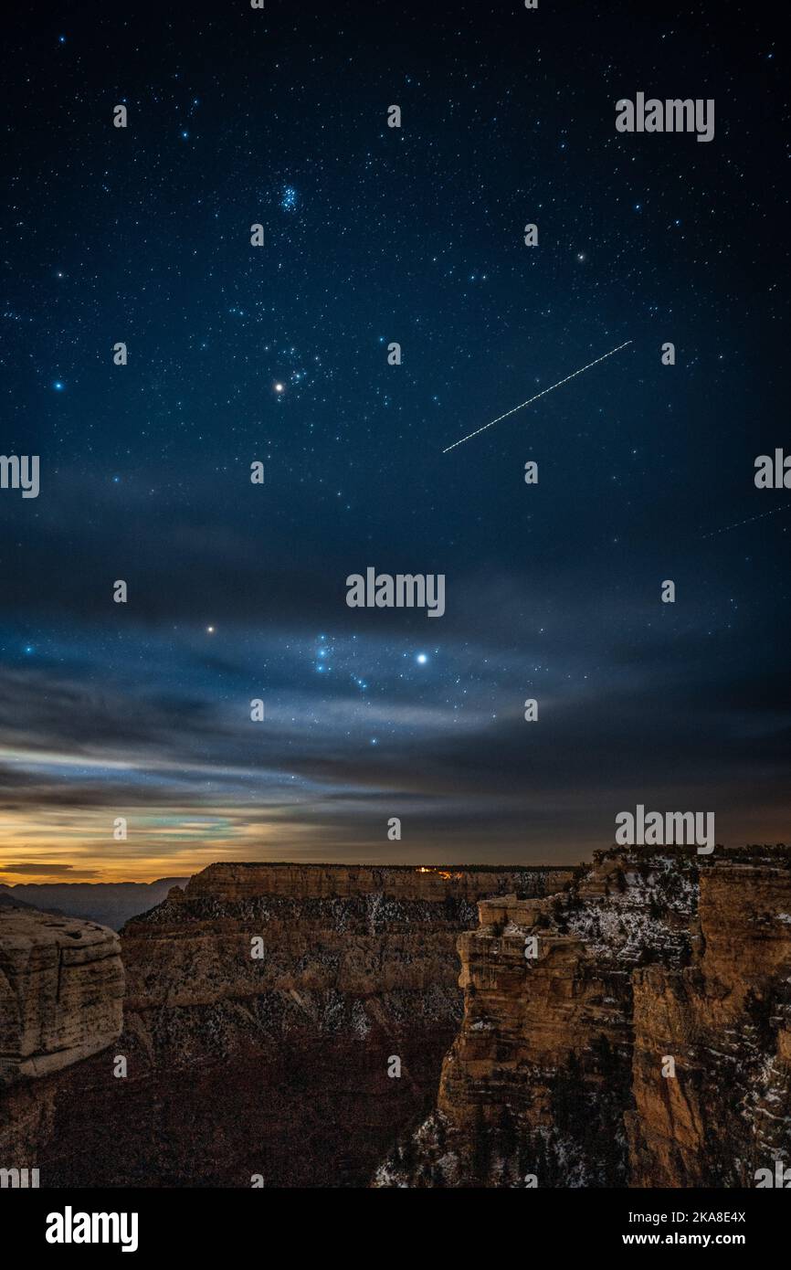 On the edge of cliff in Grand Canyon National Park under the sky full ...