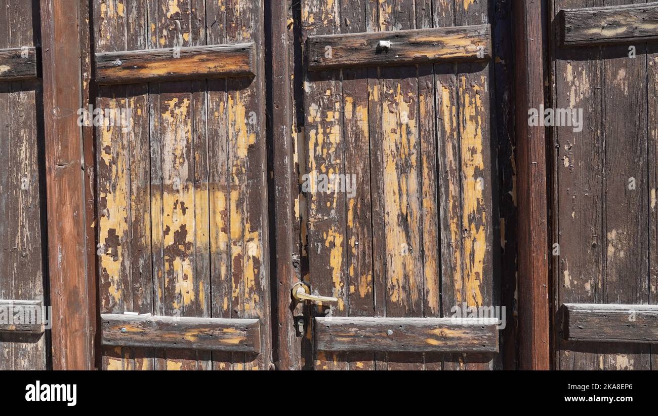 Old sliding wooden doors. Rustic concept Stock Photo - Alamy