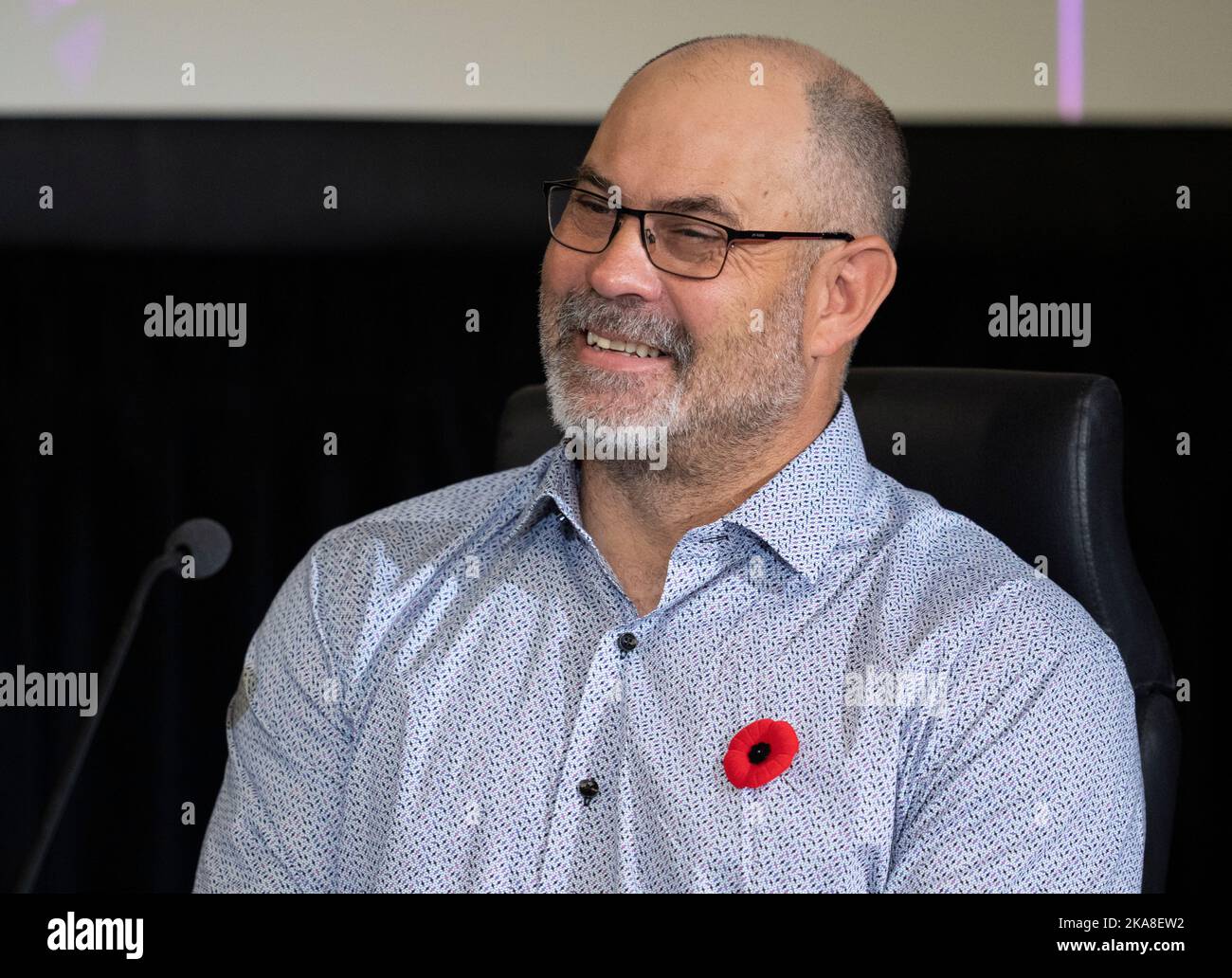 Freedom Convoy organizer Chris Barber smiles as he responds to a ...