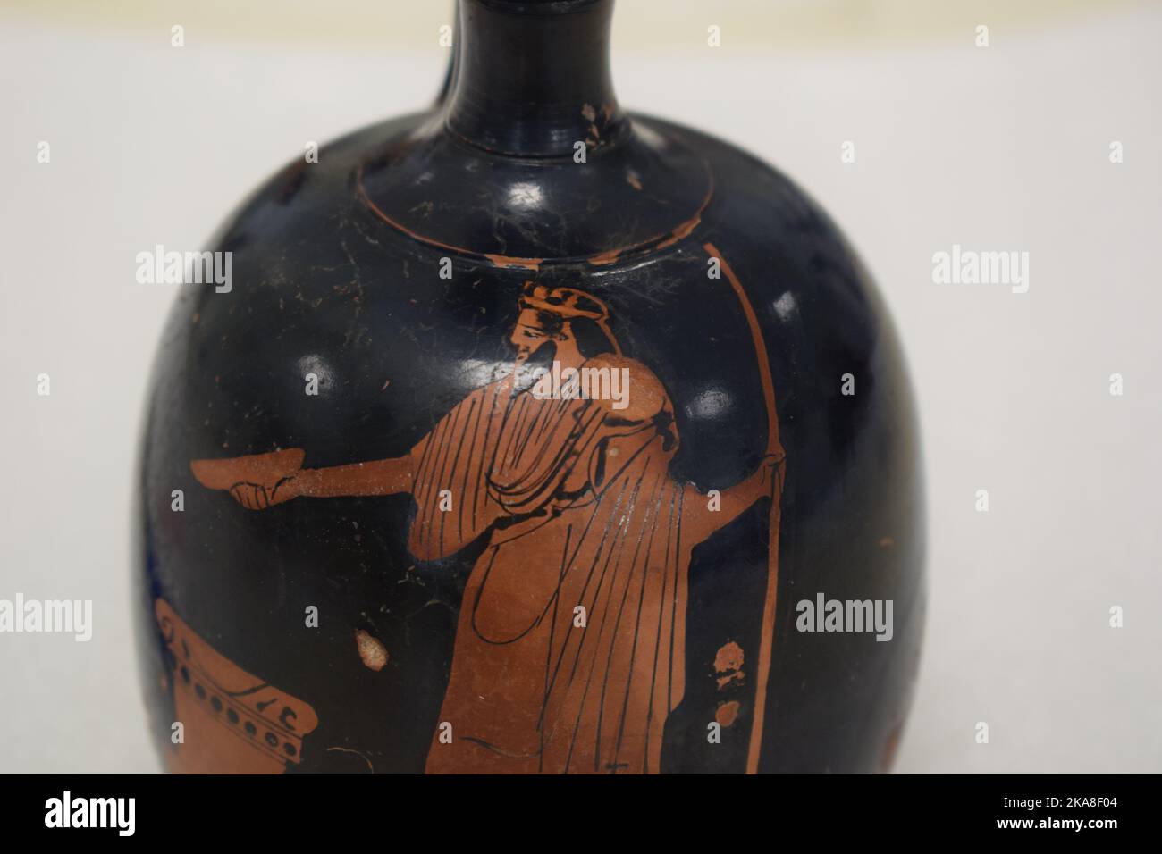 A closeup shot of an antique Greek-style vase with drawings Stock Photo ...