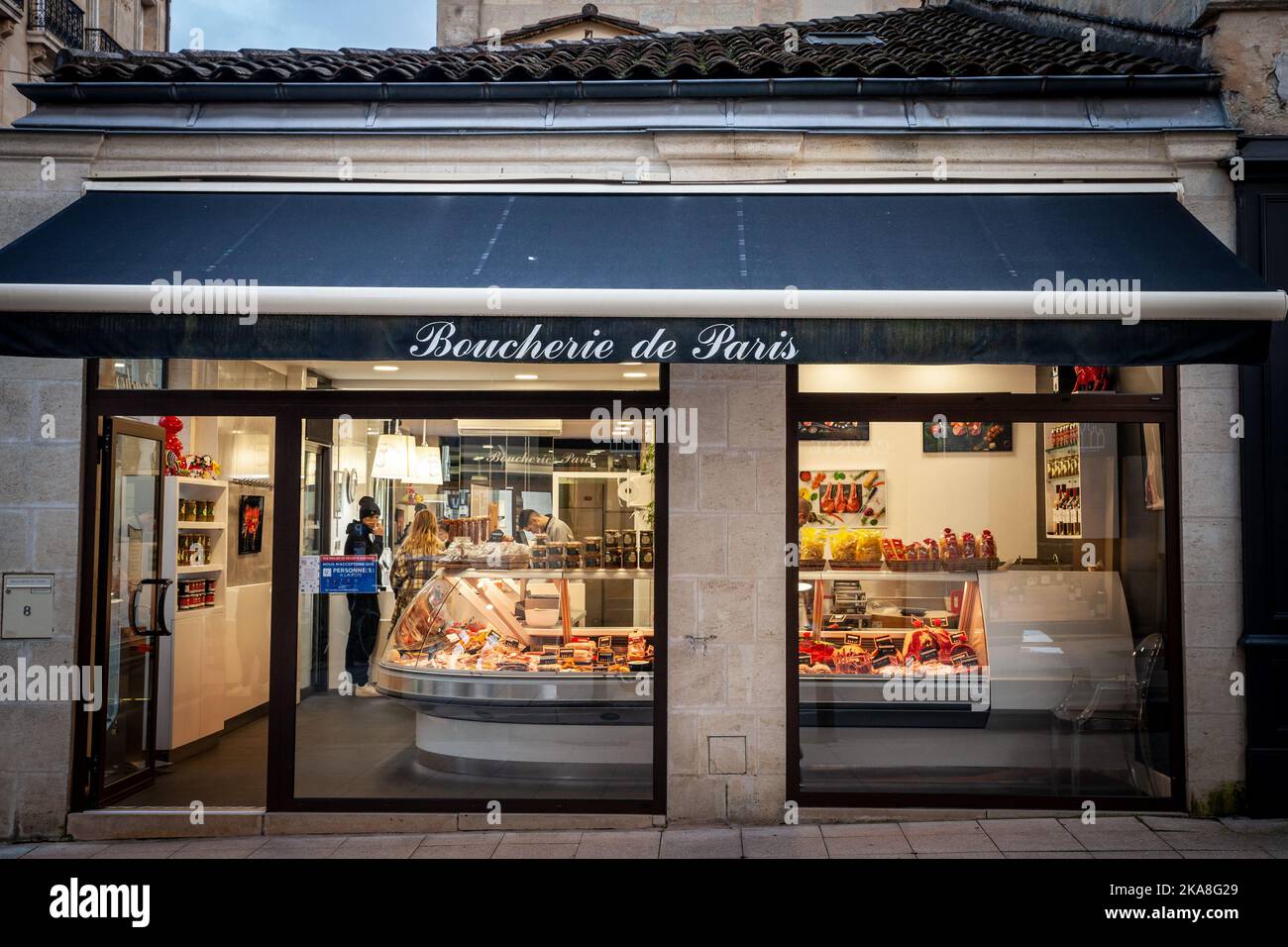 PIcture of a french butcher shop, called boucherie de Paris, a small ...