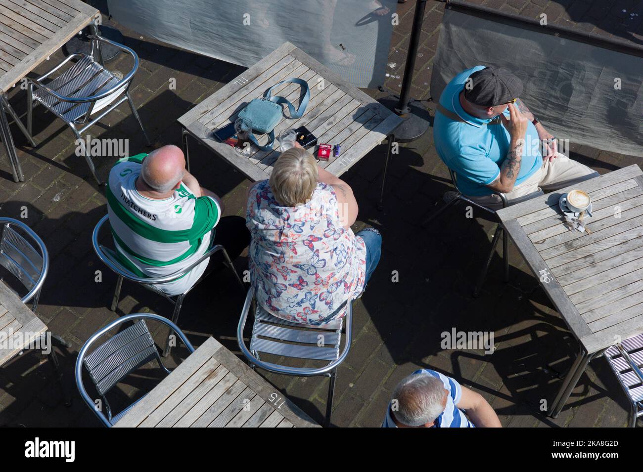 people sat in cafe in summer Stock Photo - Alamy