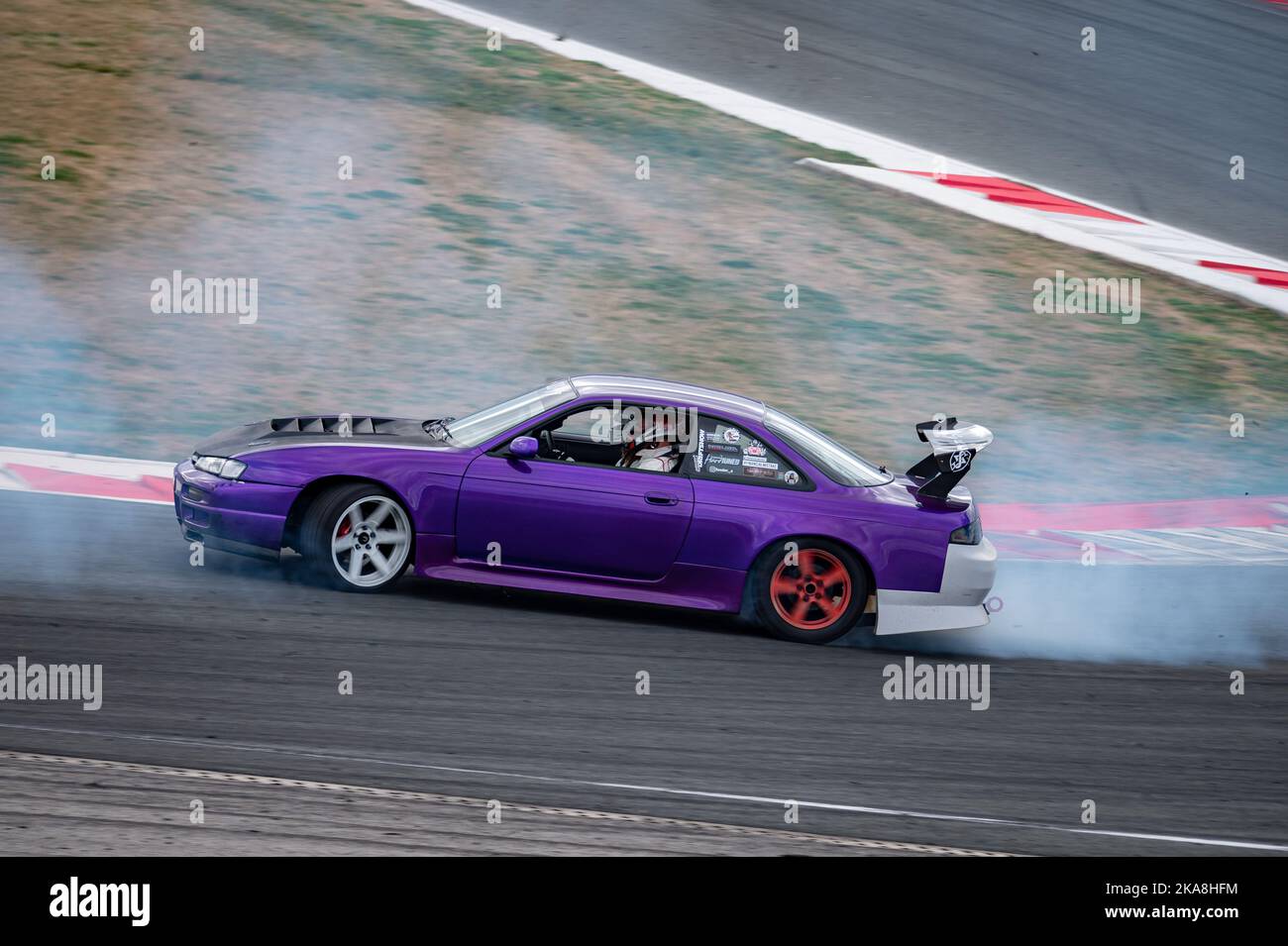 Nissan Silvia S14 drifting on the race track Stock Photo - Alamy