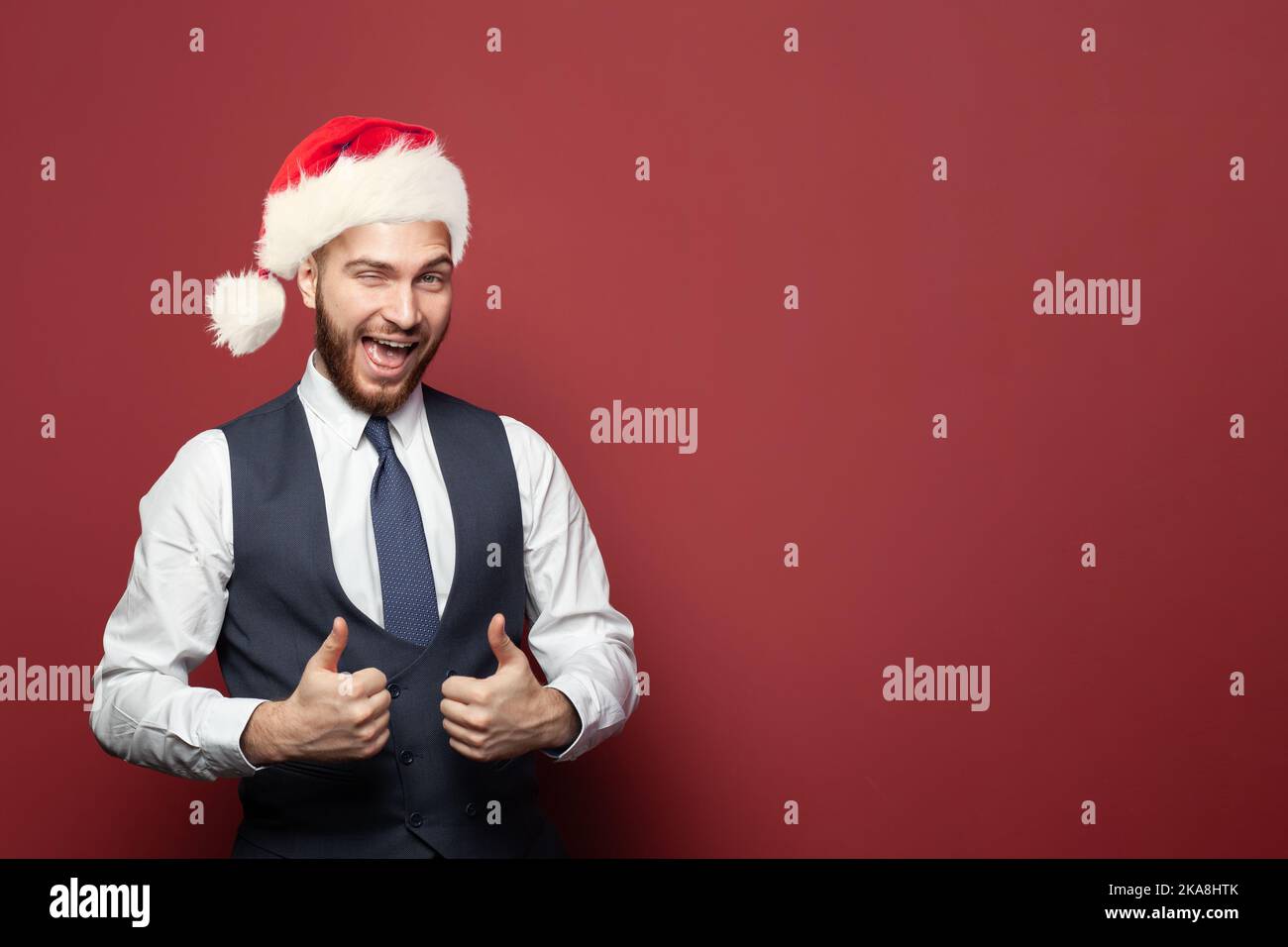 Cheerful handsome man winking hi-res stock photography and images - Alamy