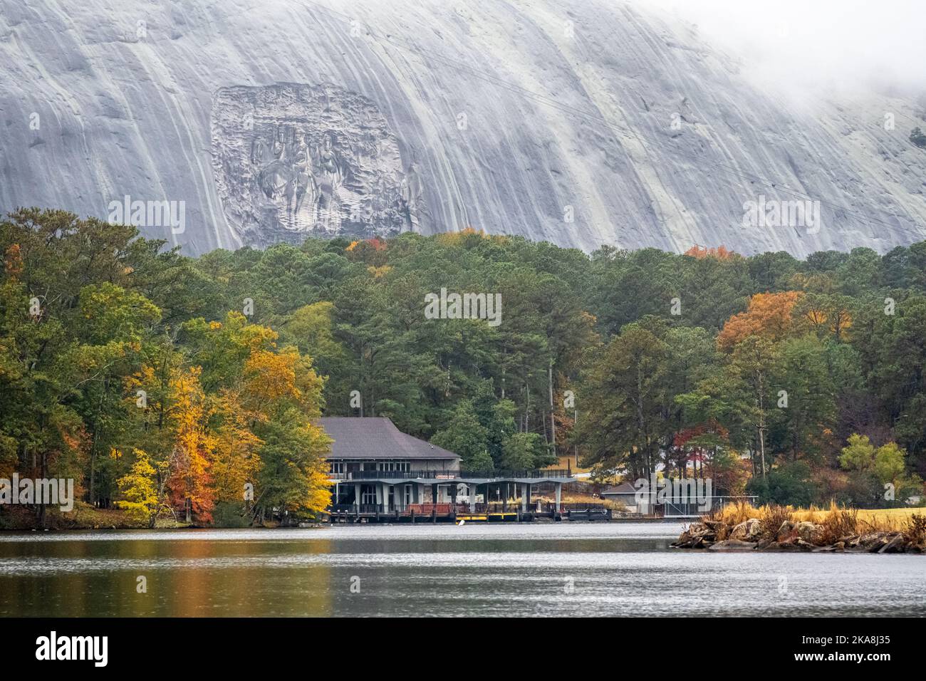 Golf course view of Stone Mountain Park with autumn color beneath the ...
