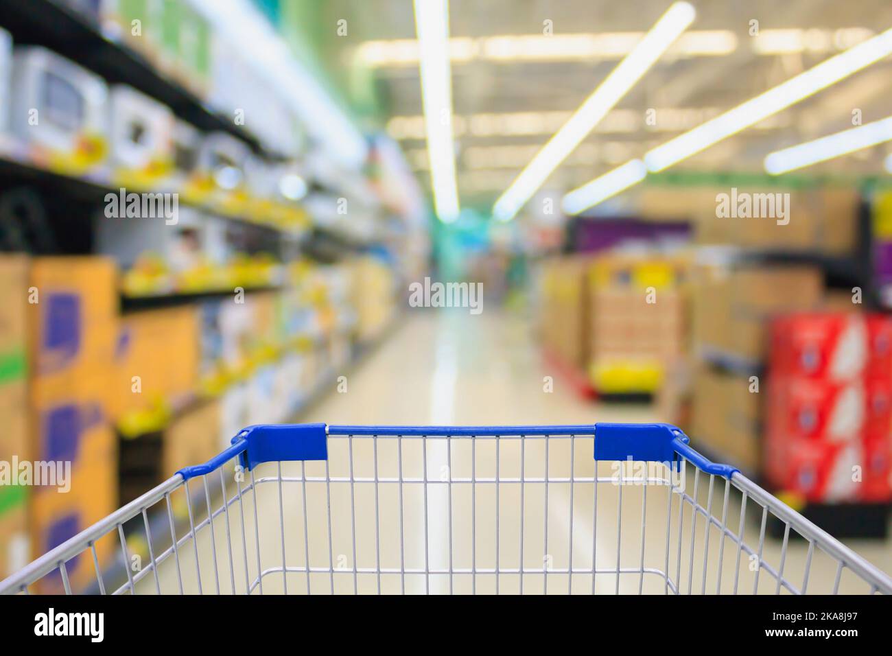 shopping cart with eletronic department store blurred background Stock ...