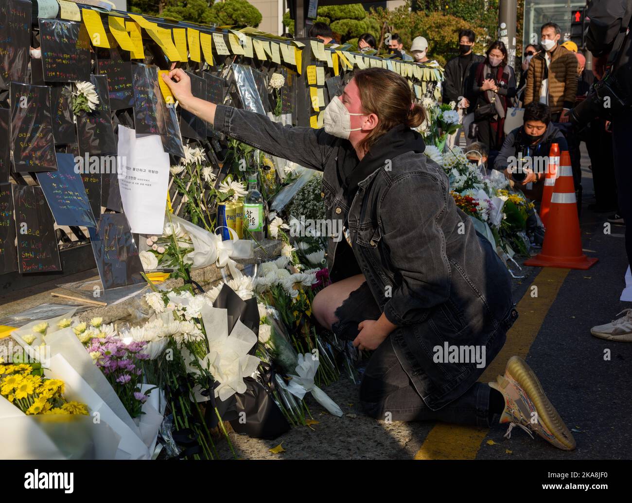 Seoul, South Korea - 01 Nov 2022, A mourner leaves a note of ...