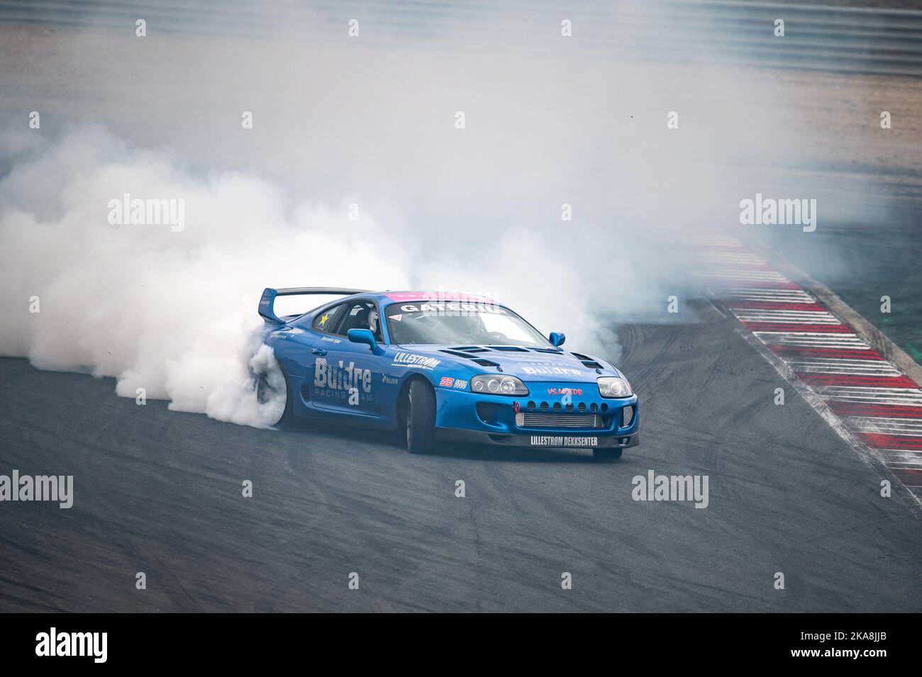 Toyota Supra, it's an A80 MK4 drifting in the circuit Stock Photo - Alamy