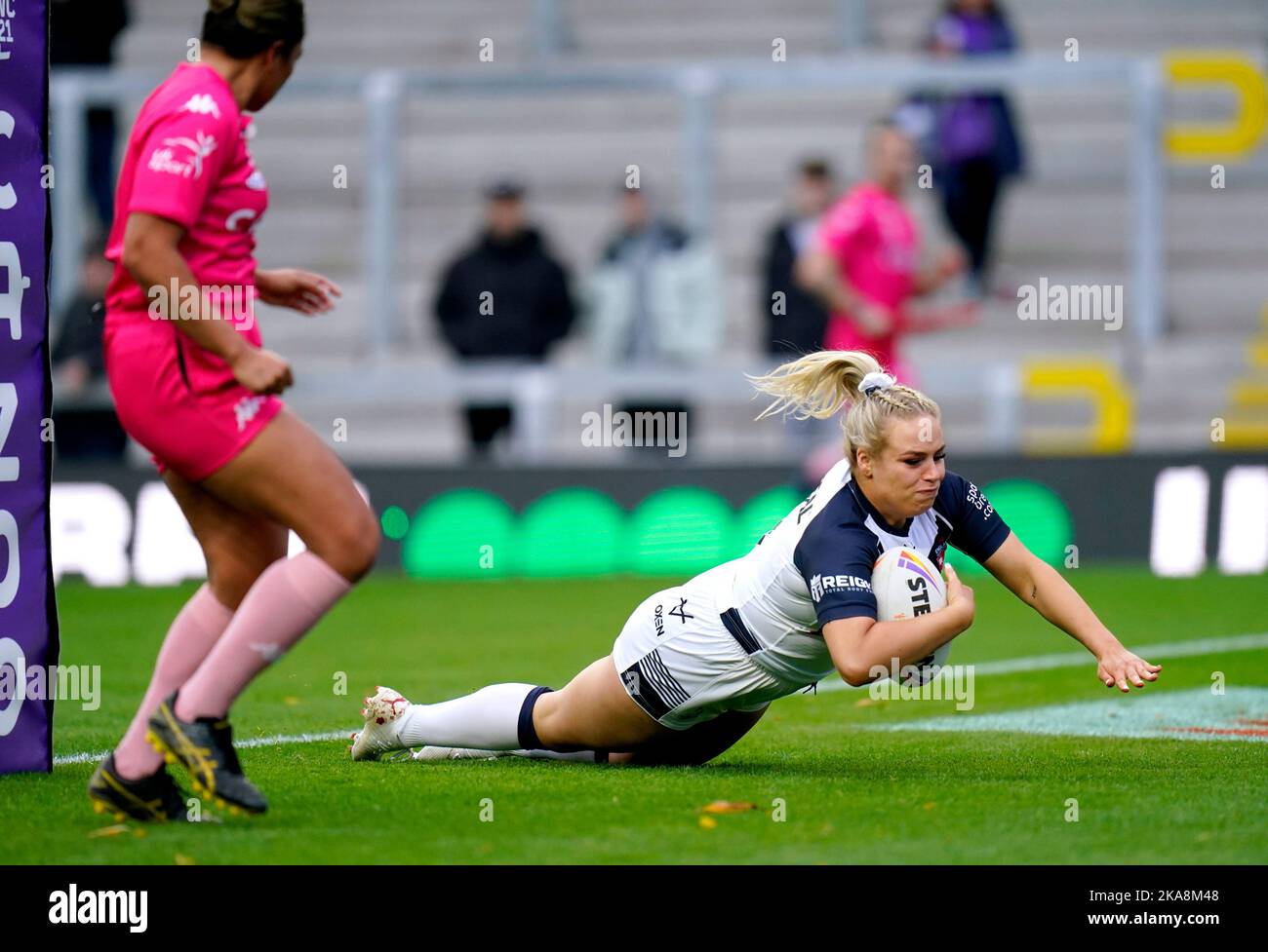 England's Grace Field scores their side's fifth try during the Women's ...