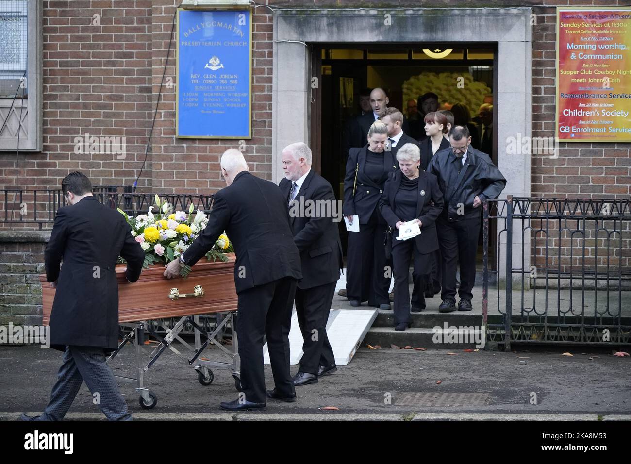 The coffin of Baroness May Blood is carried from Ballygomartin ...