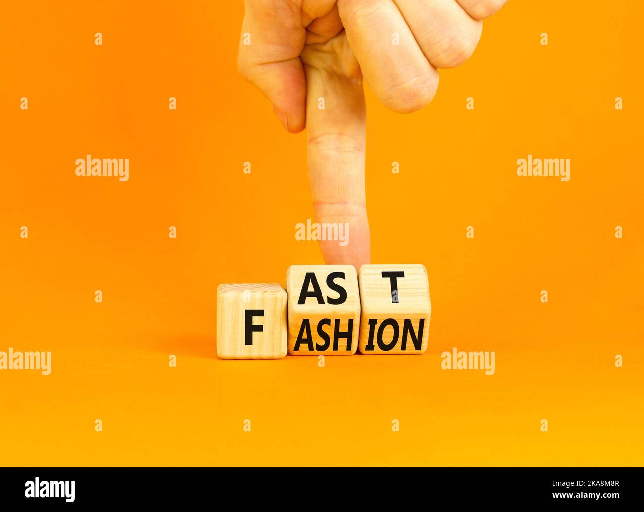 Fast fashion symbol. Concept words Fast fashion on wooden cubes ...
