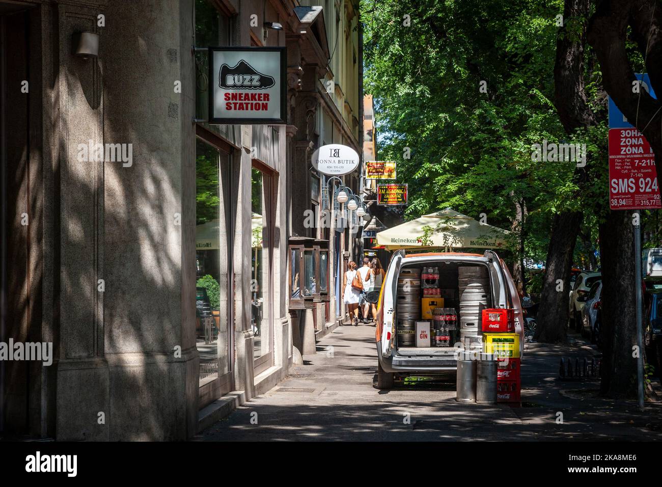 Picture of a delivery van of alcohol and spirits with beer kegs being ...
