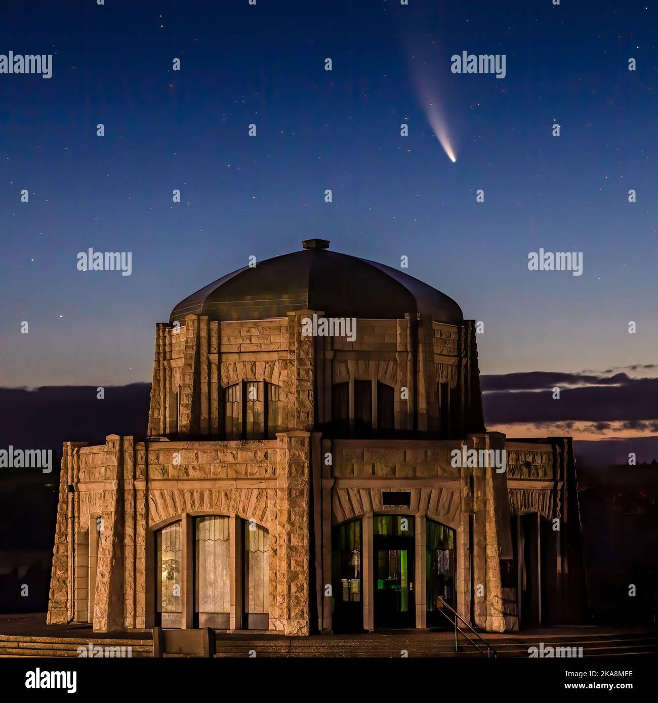A closeup of a beautiful building with a starry night sky background ...