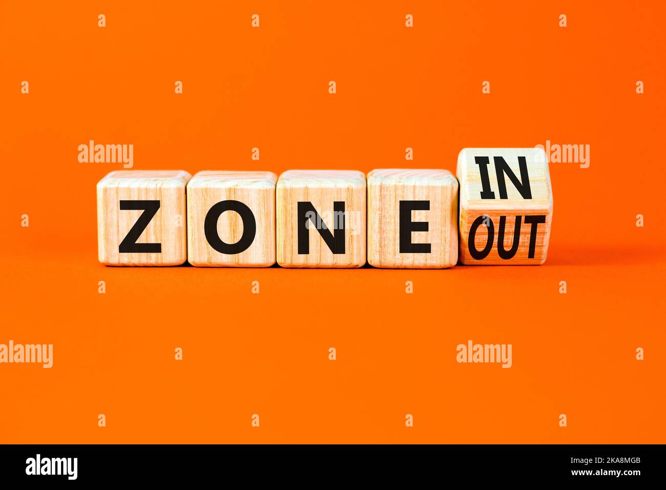 Zone in or out symbol. Concept words Zone in and Zone out on wooden ...