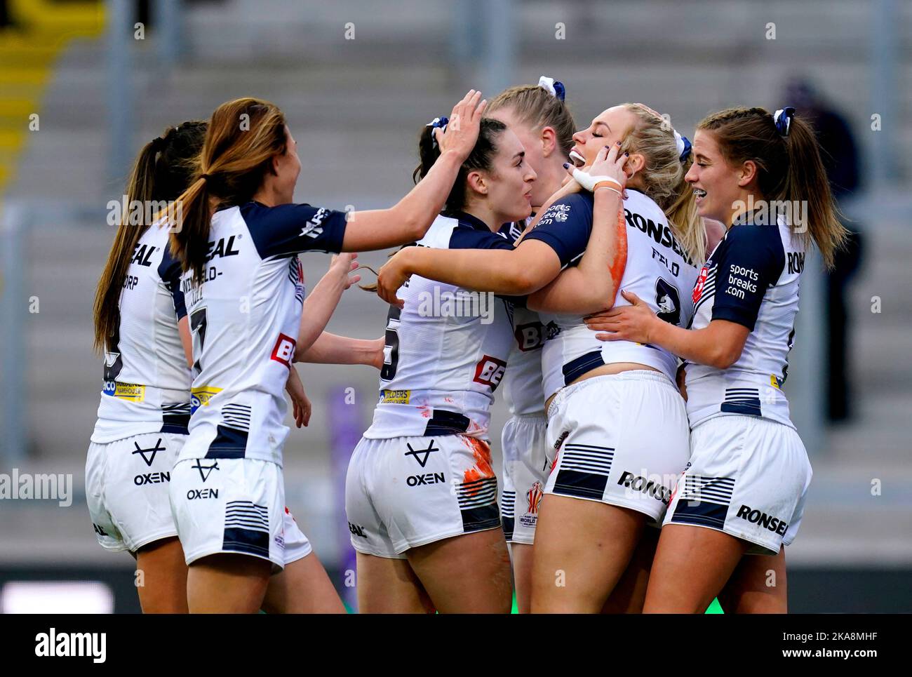 England's Grace Field celebrates with her team-mates after scoring ...
