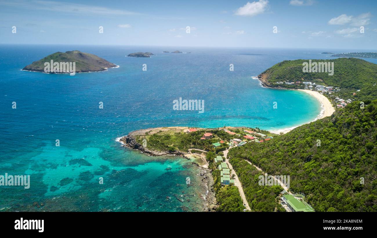 A beautiful eagle-eye view of the island coast with several resorts ...
