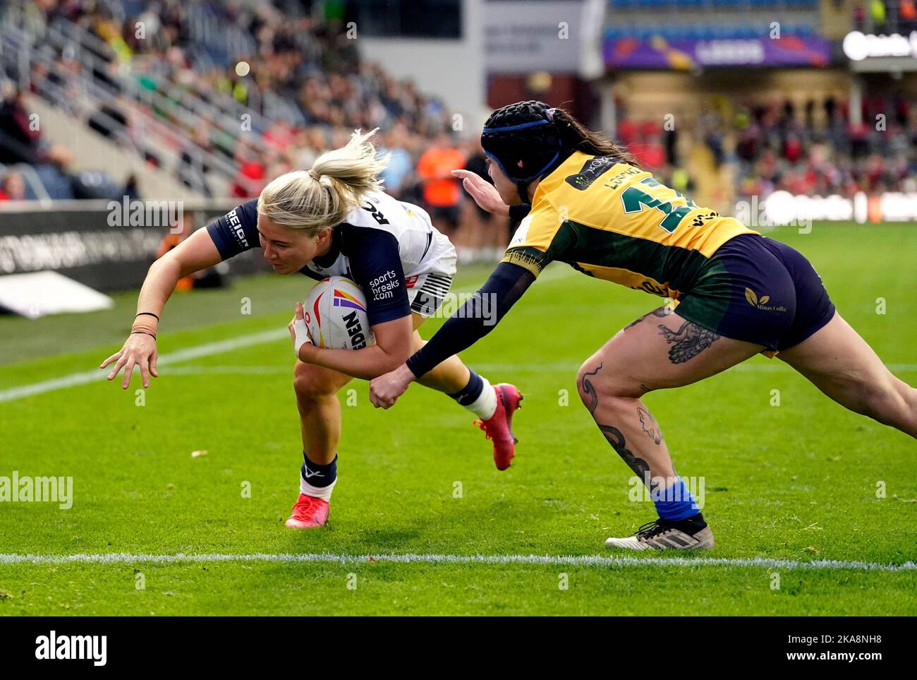 England's Tara-Jane Stanley scores their side's seventh try during the ...