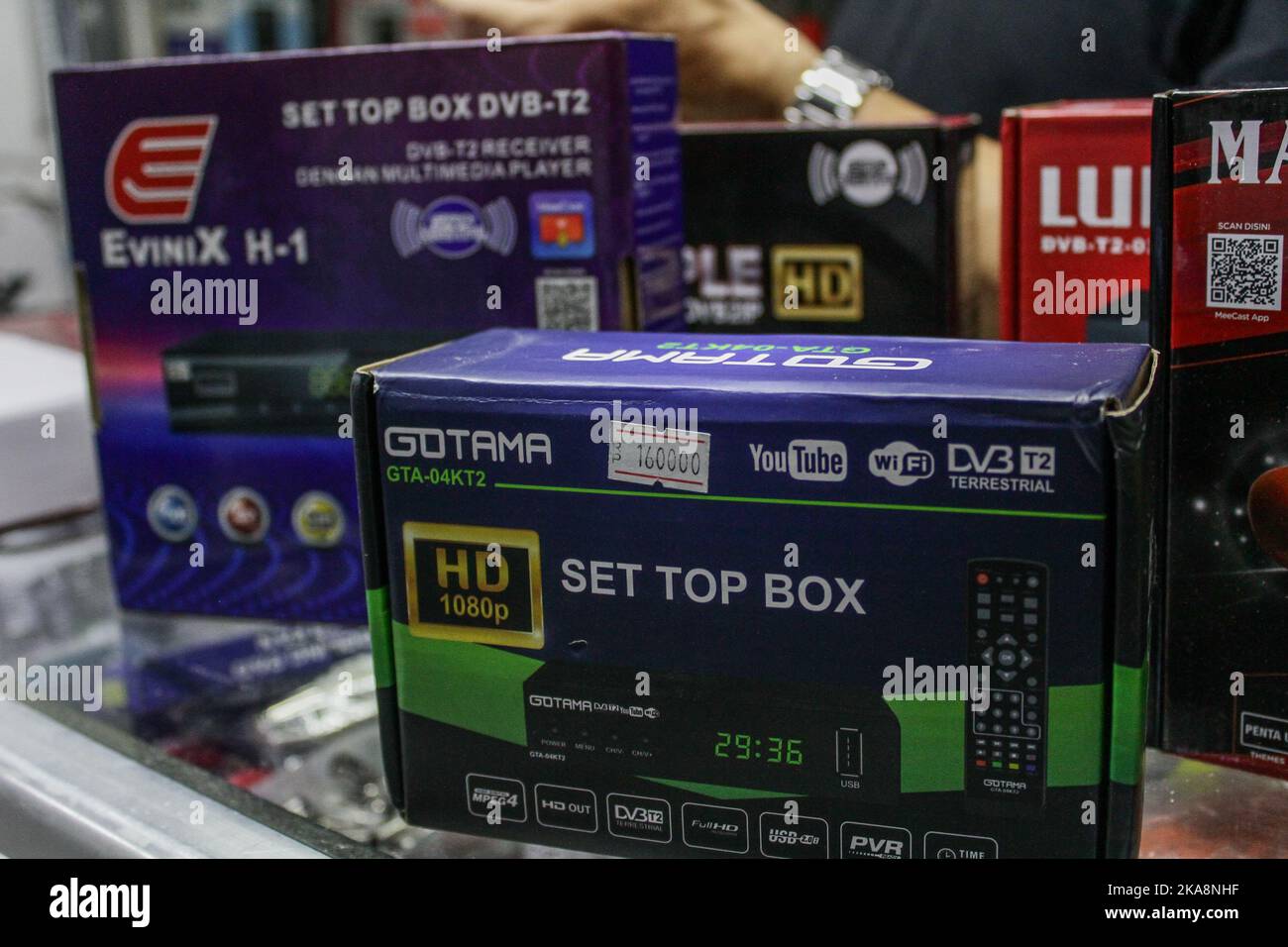 Set-up boxes for digital television seen on display for sale in Bandung ...
