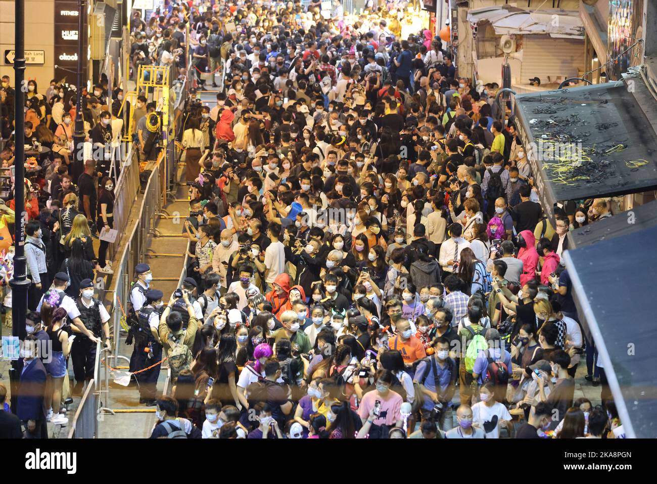 People celebrate Halloween in Lan Kwai Fong, Central, while police ...